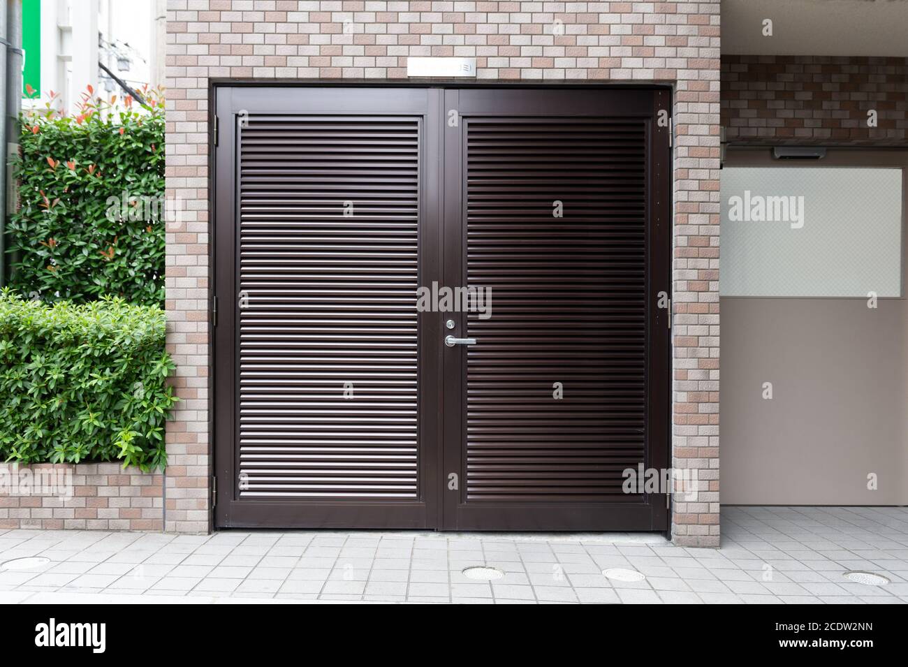 sidewalk by street wall & door Stock Photo - Alamy