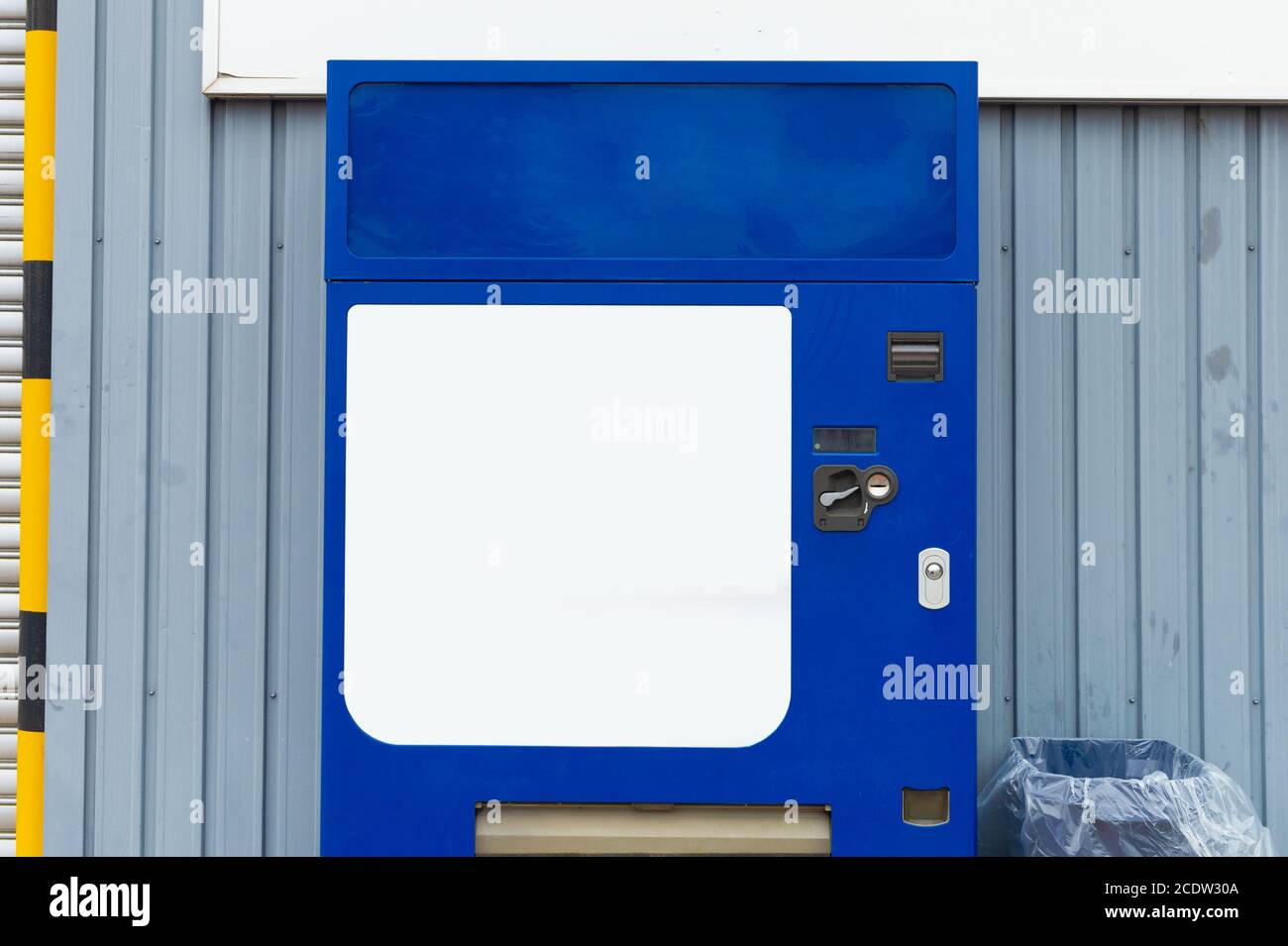 Empty white shelves of standard office vending machine Stock Photo - Alamy