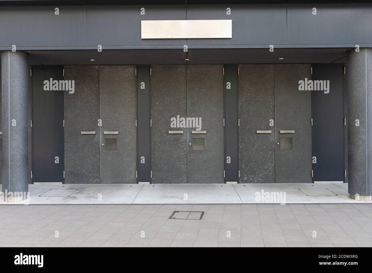 sidewalk by street wall & door Stock Photo - Alamy