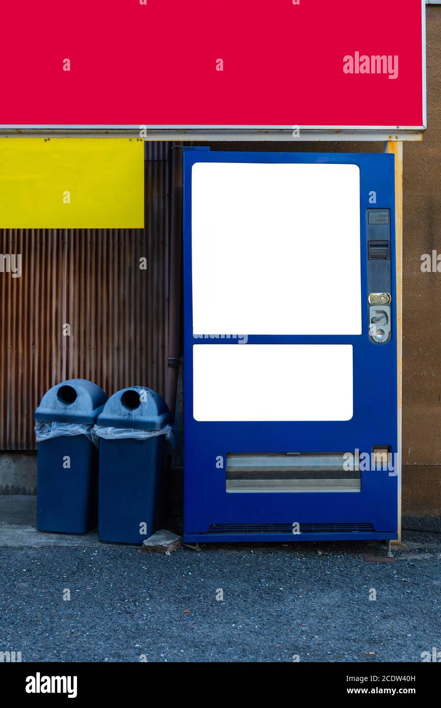 Empty white shelves of standard office vending machine Stock Photo - Alamy