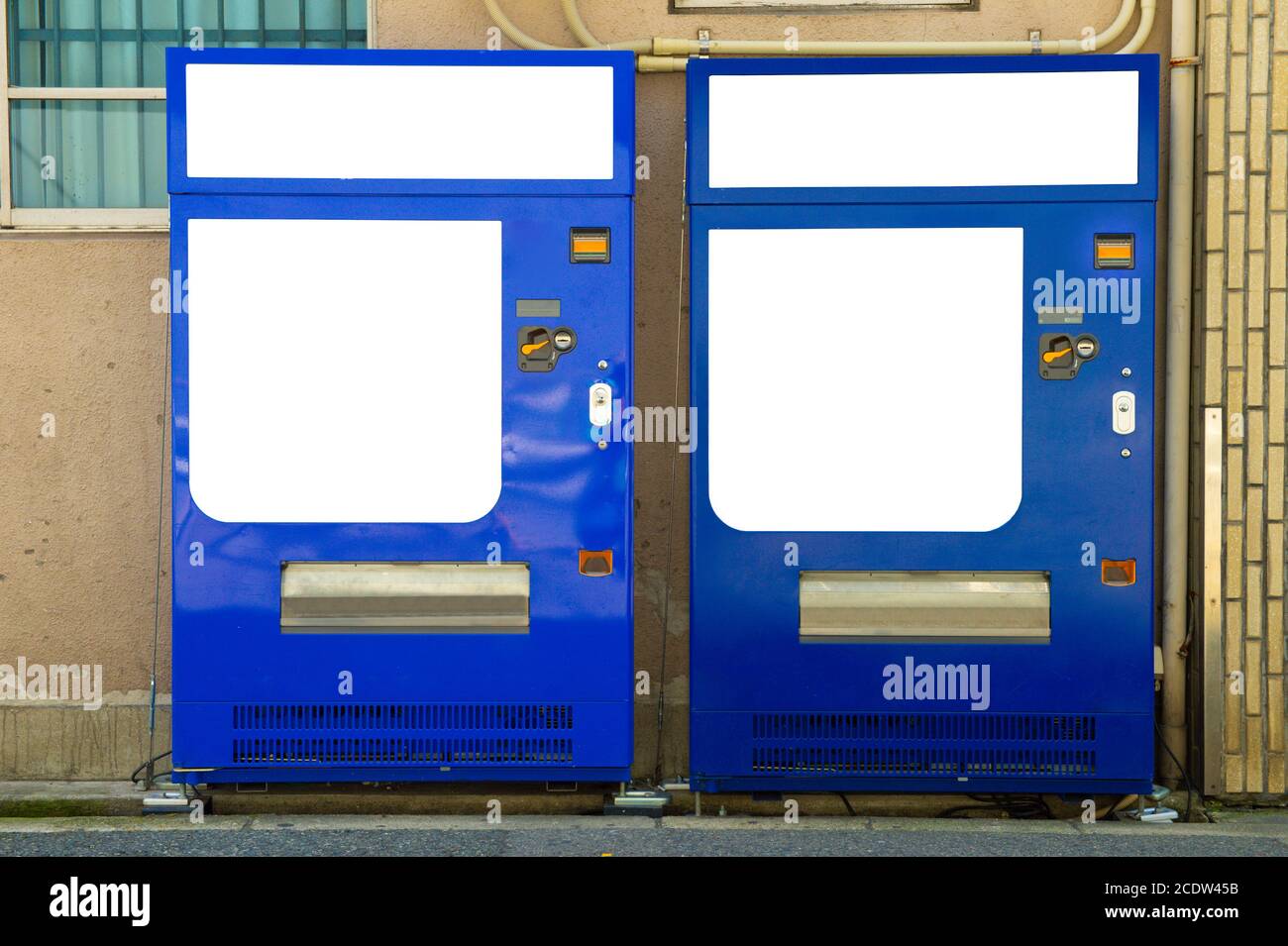 Empty white shelves of standard office vending machine Stock Photo - Alamy