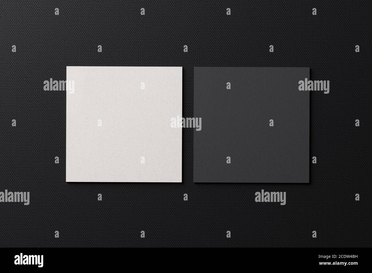 White square shape paper business card mockup on black modern fabric ...