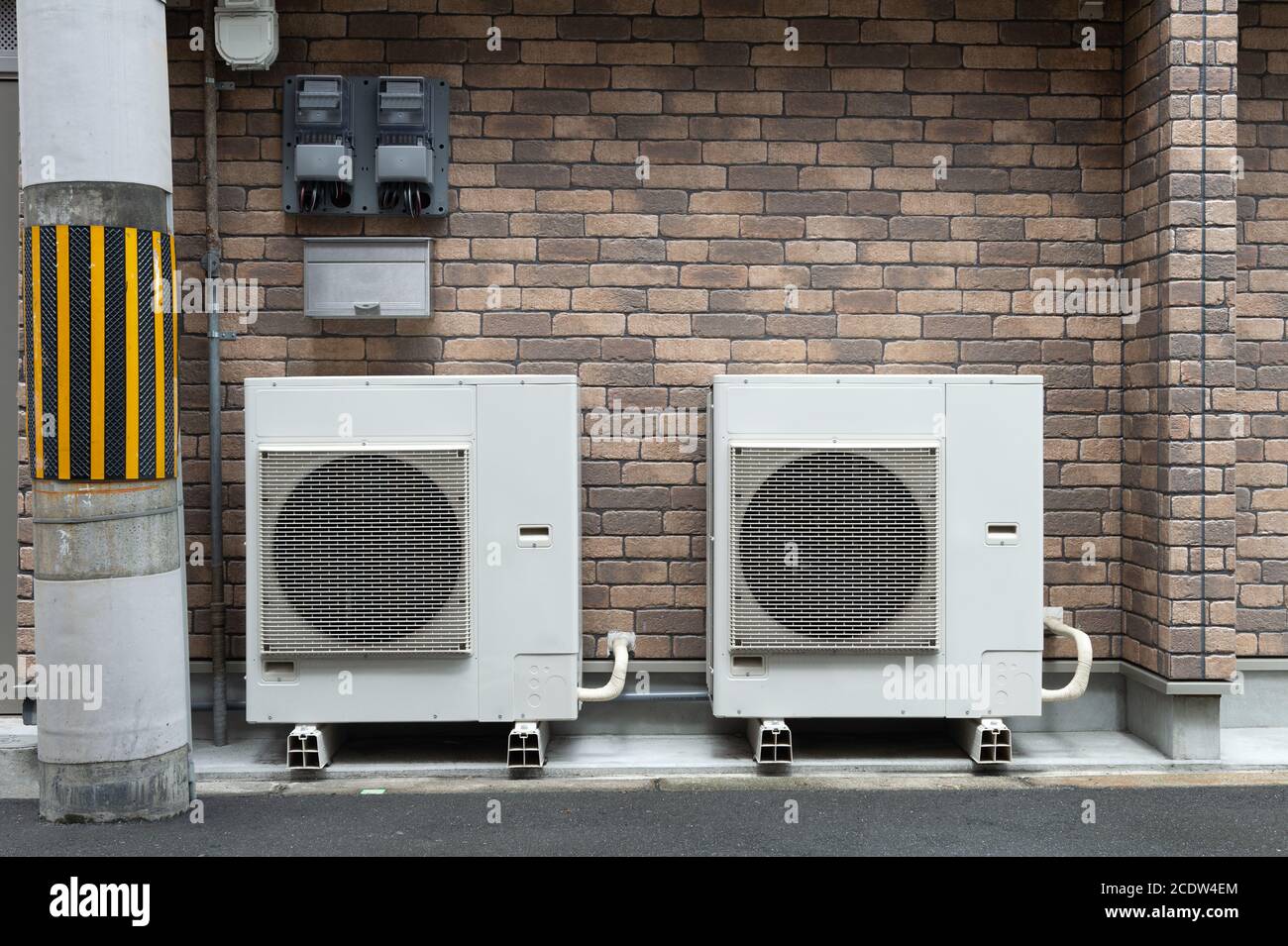 Air compressor installation on pedestal.outdoor Stock Photo - Alamy