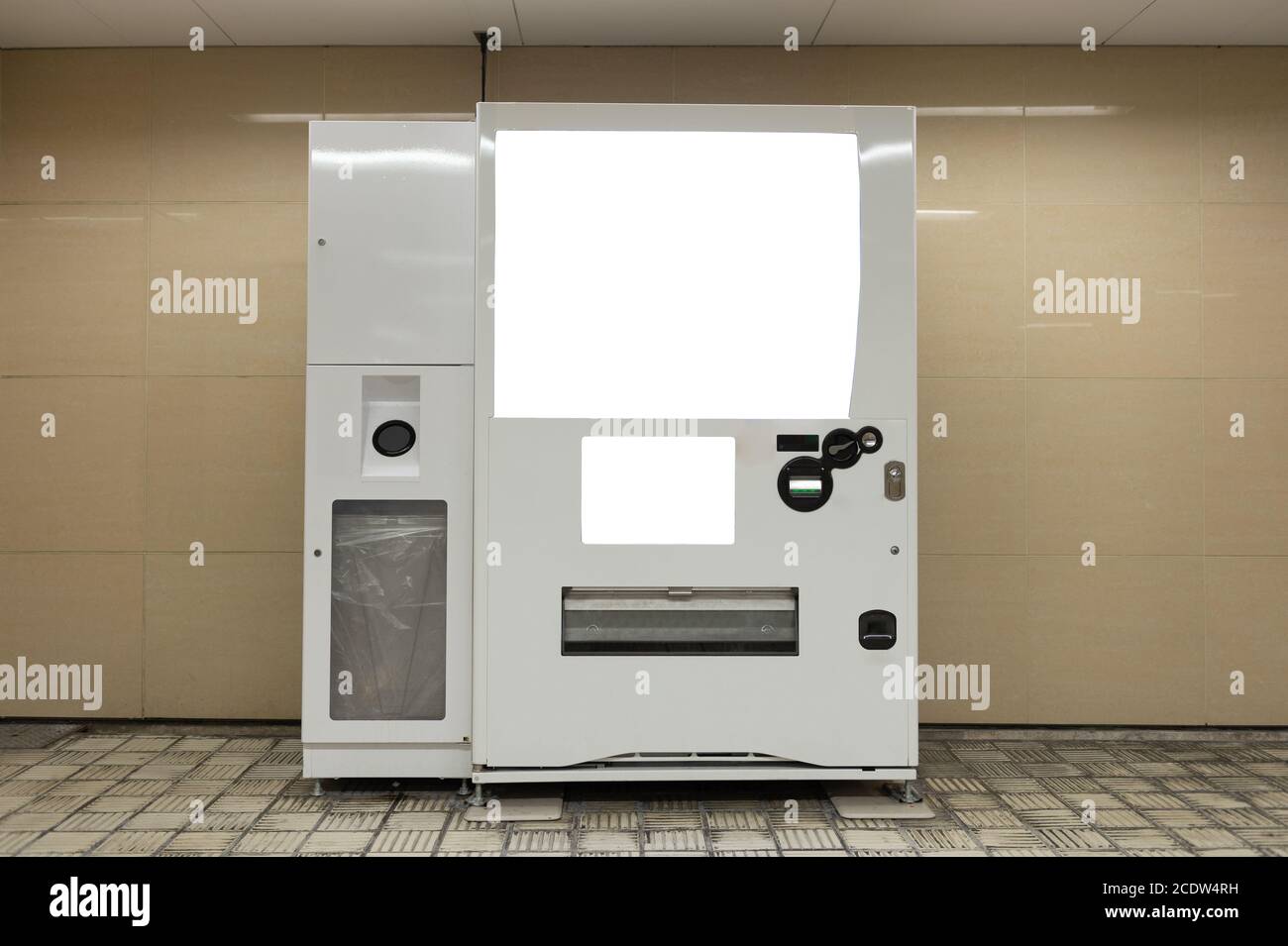 Empty white shelves of standard office vending machine Stock Photo - Alamy