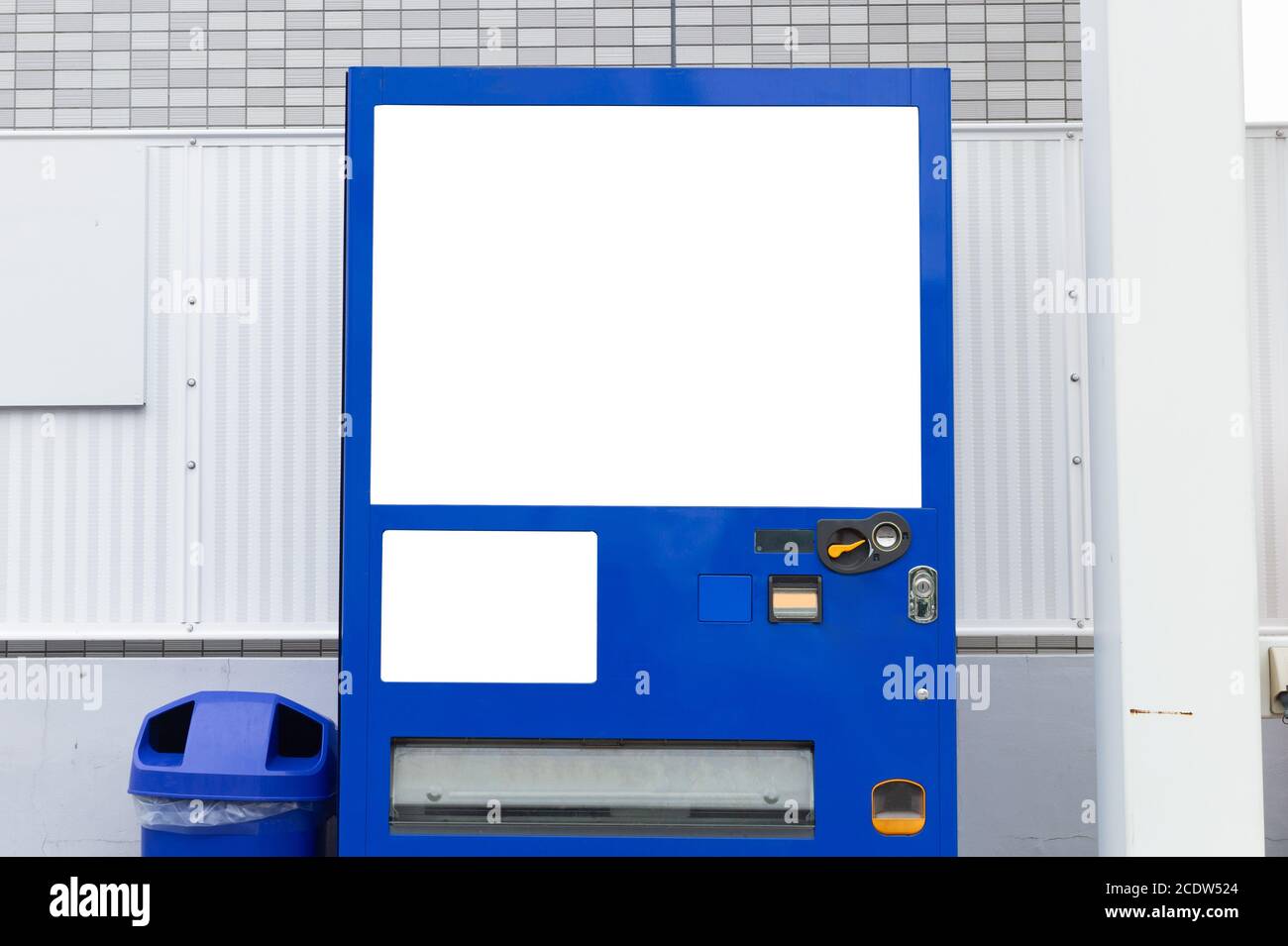 Empty white shelves of standard office vending machine Stock Photo - Alamy