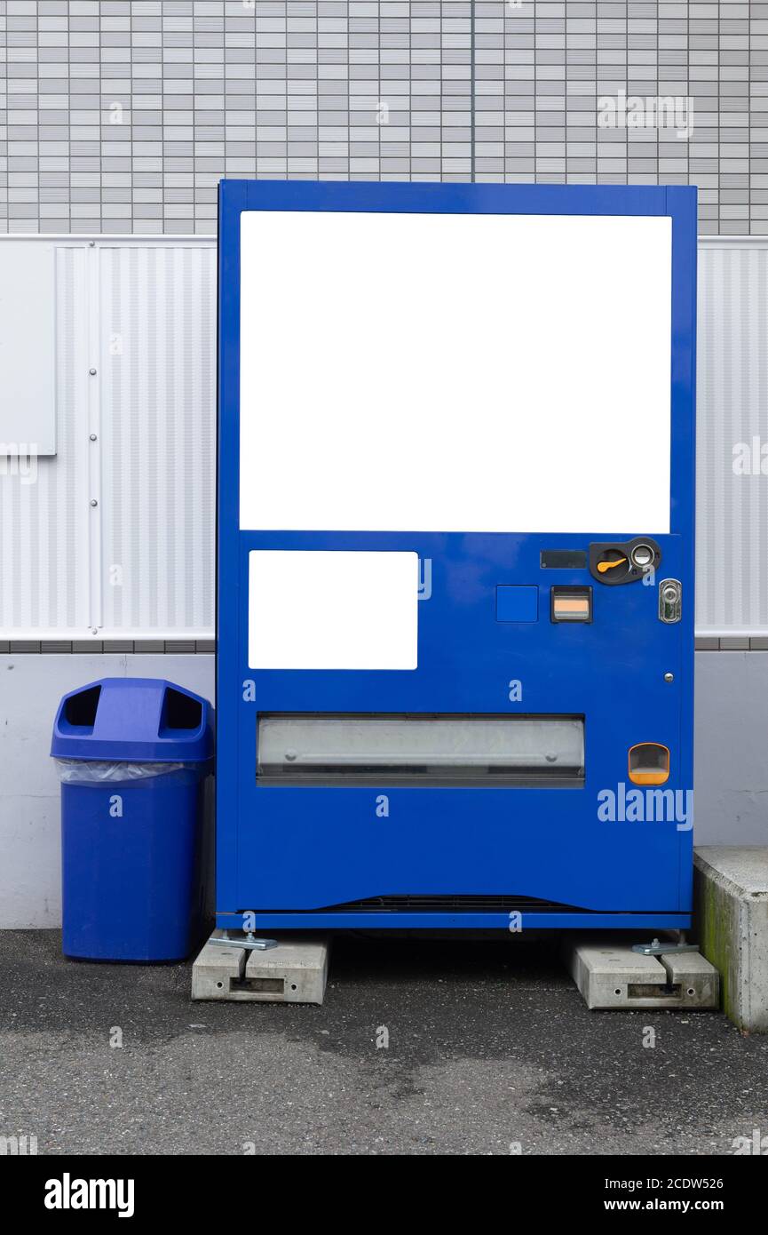 Empty white shelves of standard office vending machine Stock Photo - Alamy