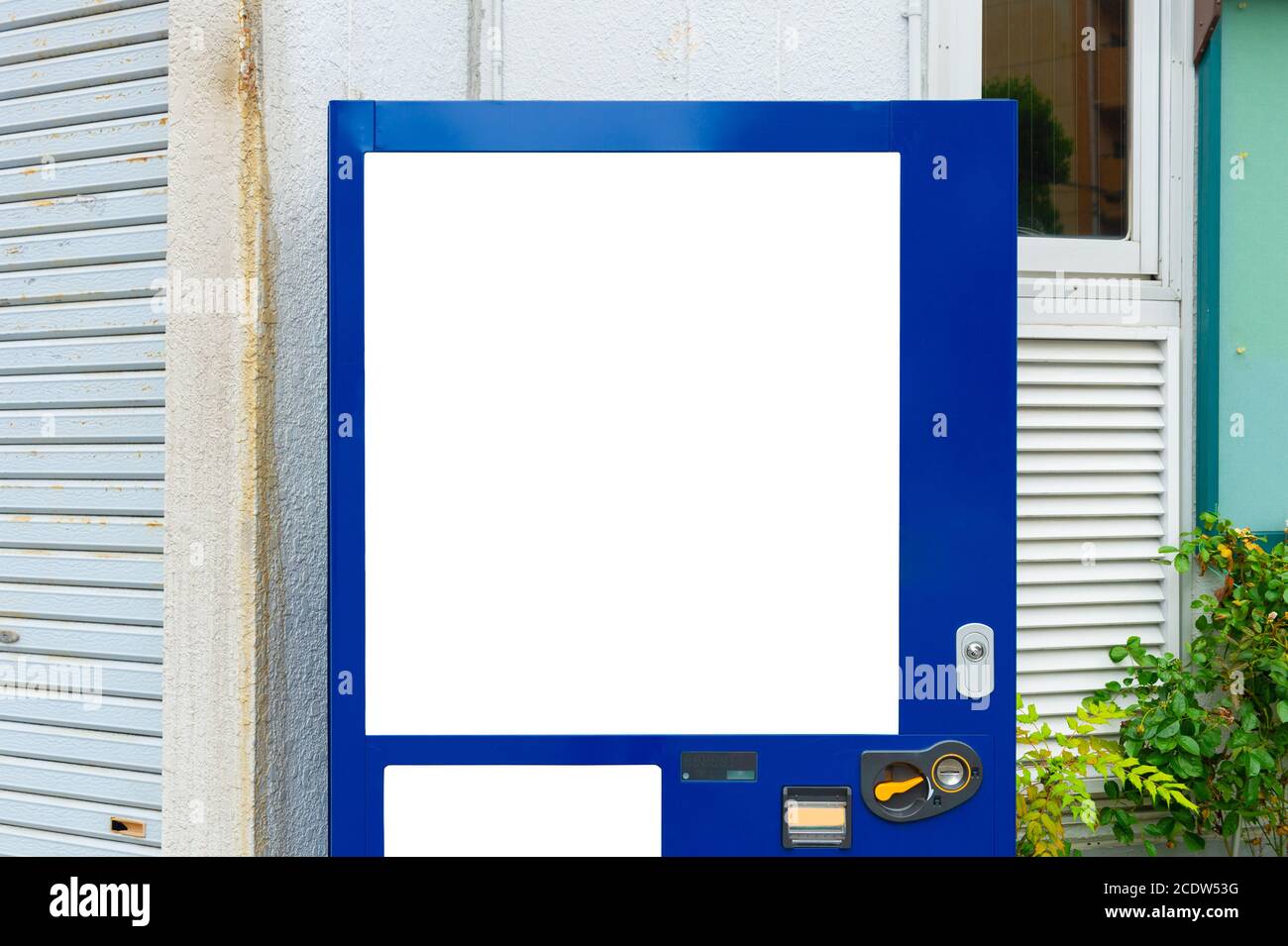 Empty white shelves of standard office vending machine Stock Photo - Alamy