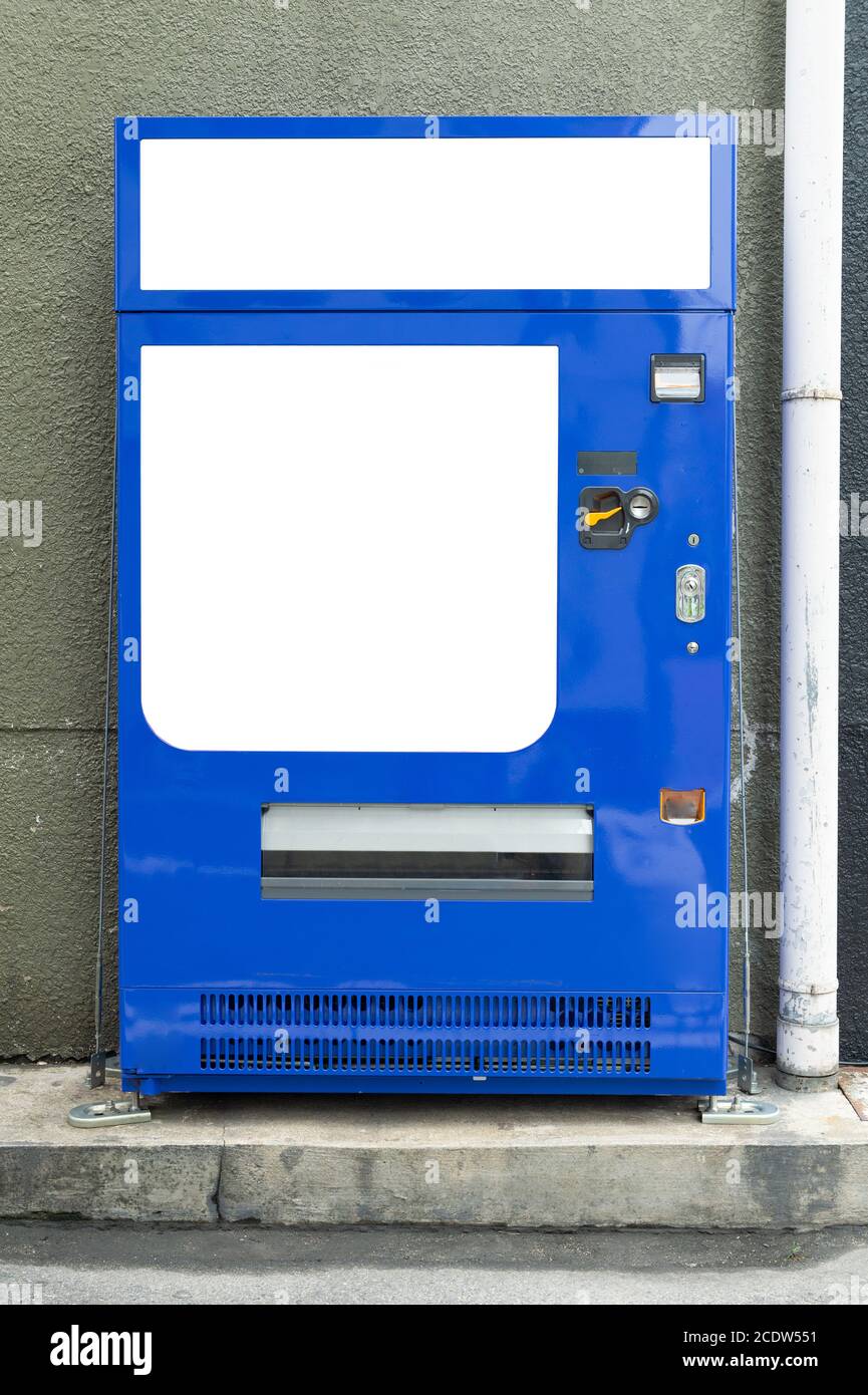 Empty white shelves of standard office vending machine Stock Photo - Alamy