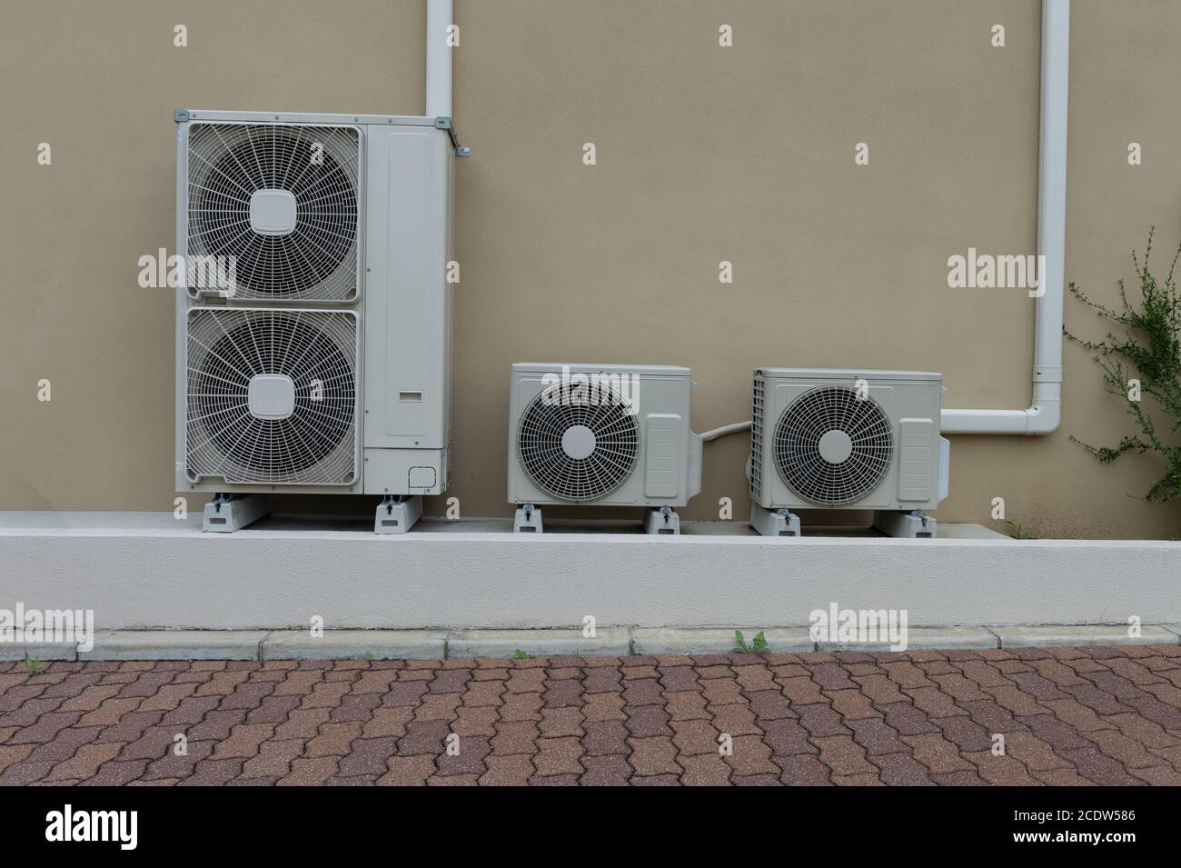 Air compressor installation on pedestal.outdoor Stock Photo - Alamy