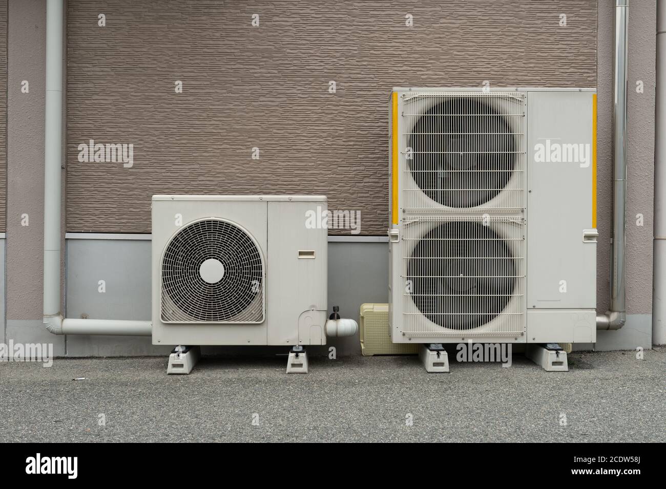Air compressor installation on pedestal.outdoor Stock Photo - Alamy