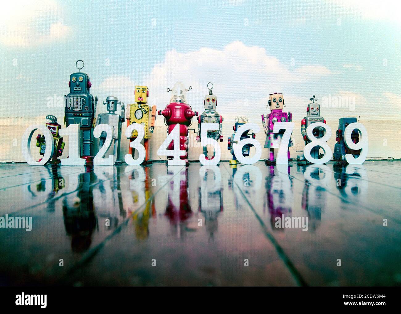 counting retro robots 0 to 9 on a wooden floor with reflection Stock ...