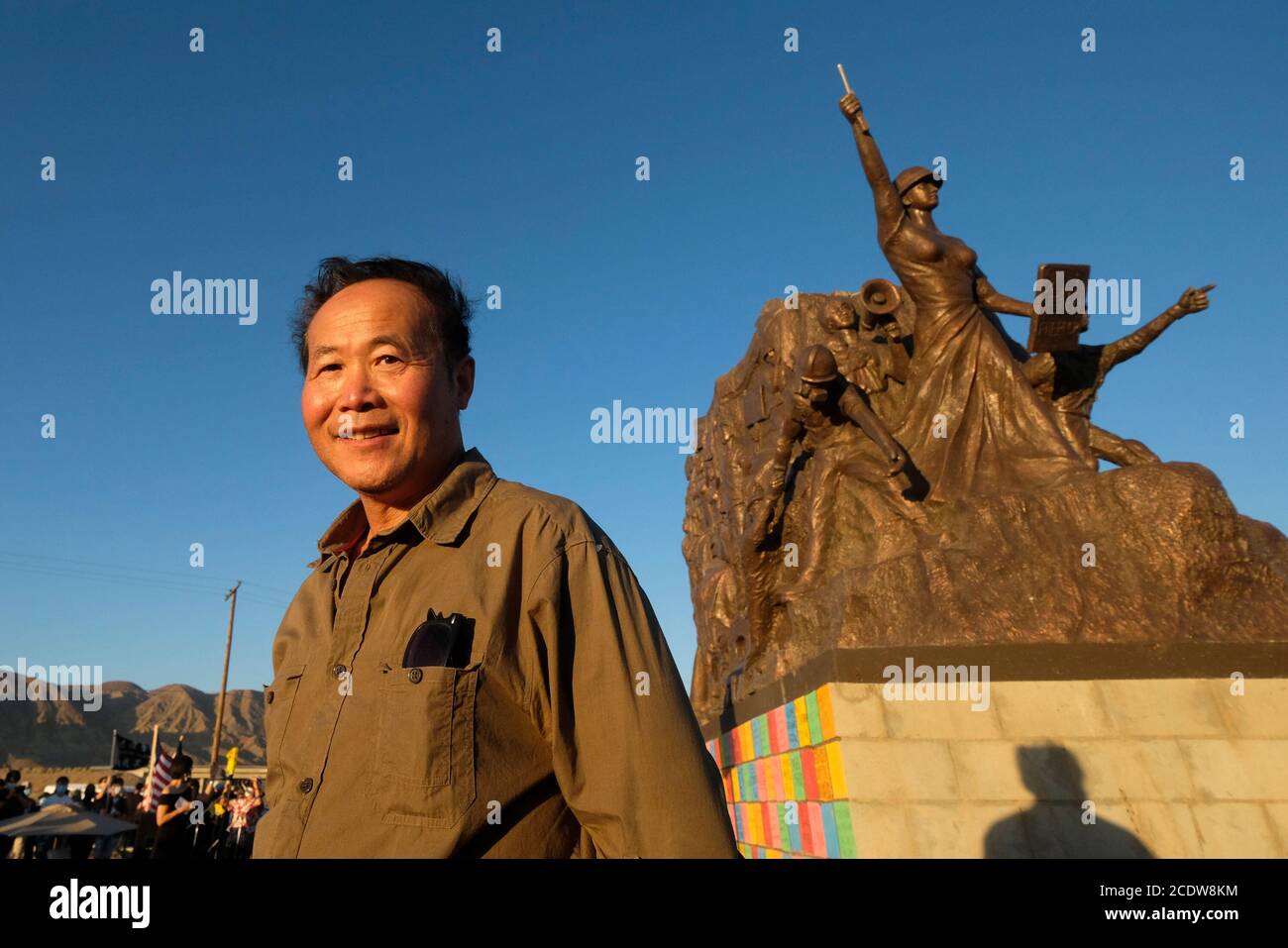 Los Angeles, California, USA. 29th Aug, 2020. Artist Weiming Chen poses in front of his work ...