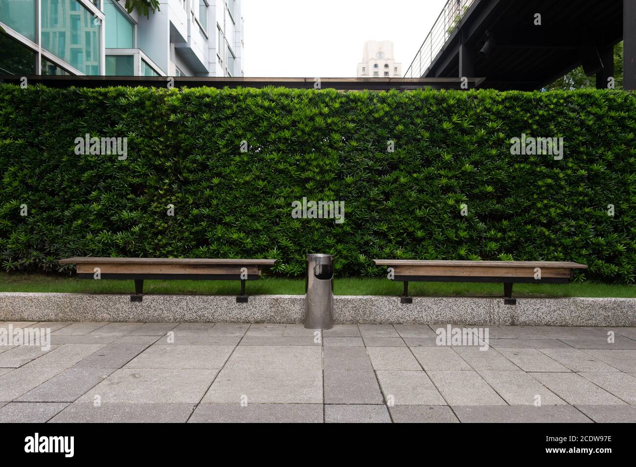 Smoking area zone:Unidentified poeple smoke in designated smoking area ...