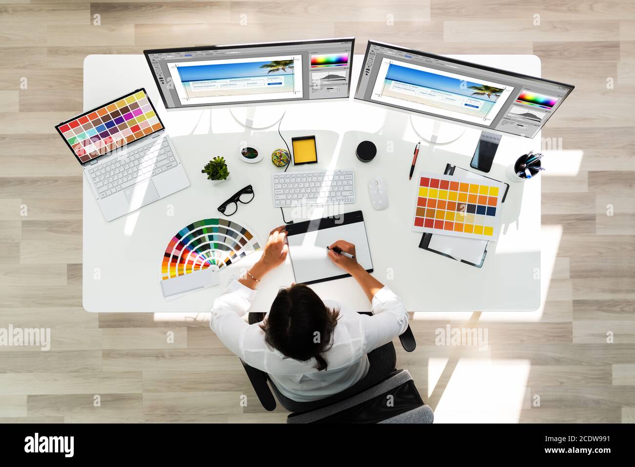 Graphic Designer Artist Working On Multiple Computer Screens Stock ...