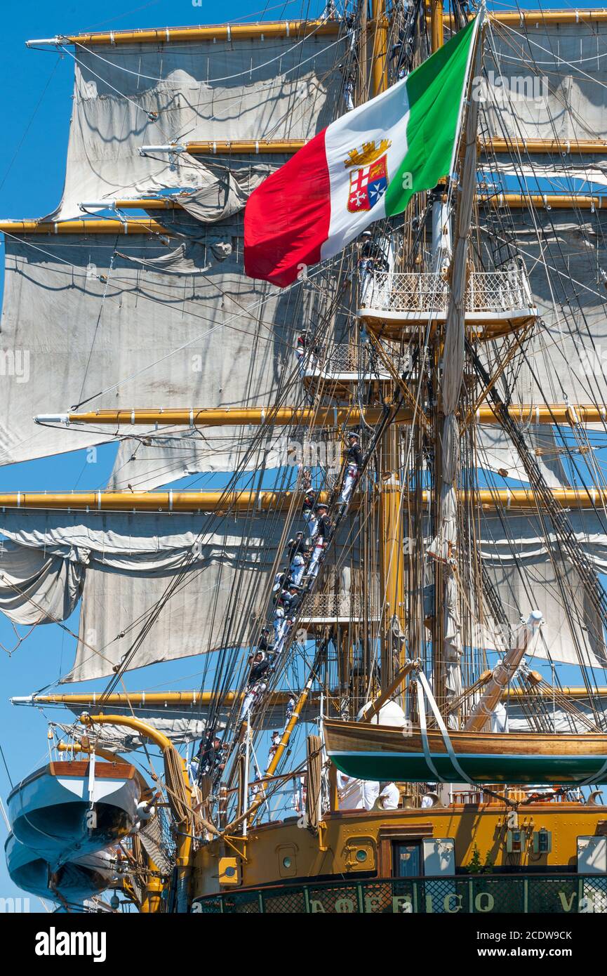 Italian Navy flag waving on the training ship of the Italian Navy ...