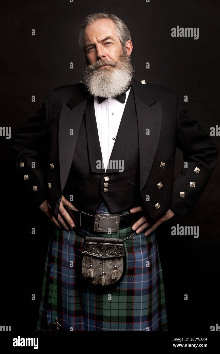 mature male model wearing kilt with grey hairstyle and beard Stock ...