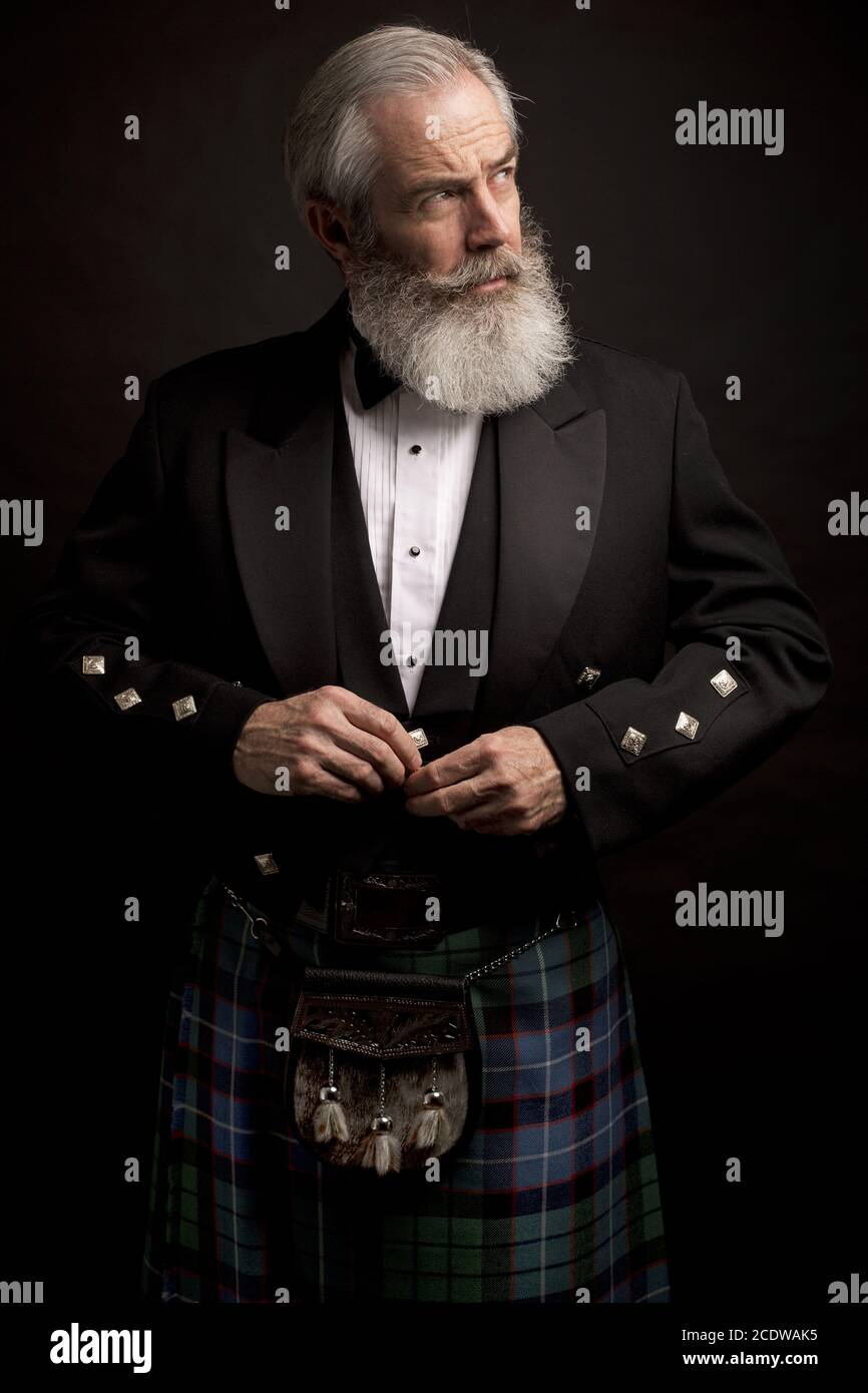 mature male model wearing kilt with grey hairstyle and beard Stock ...