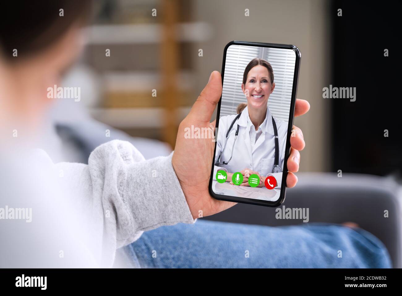 Telemedicine Video Call To Doctor On Smartphone Stock Photo - Alamy