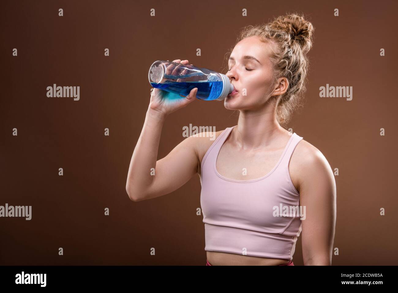 Sportswoman holding towel hi-res stock photography and images - Alamy