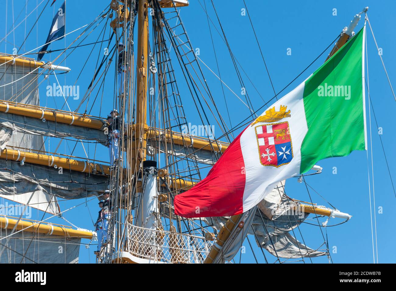 Italian Navy flag waving on the training ship of the Italian Navy ...