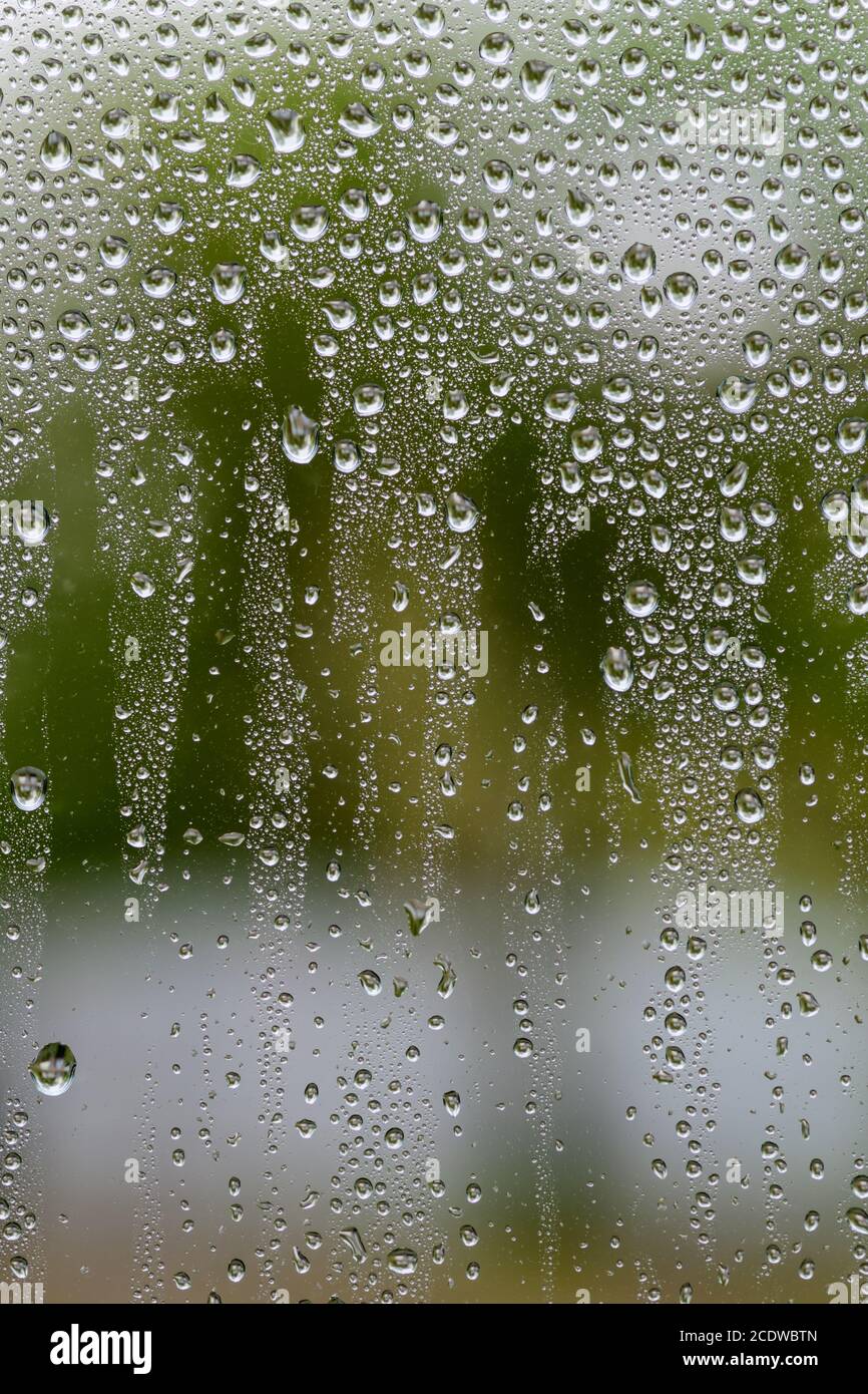 Water drops from rain on window glass Stock Photo - Alamy