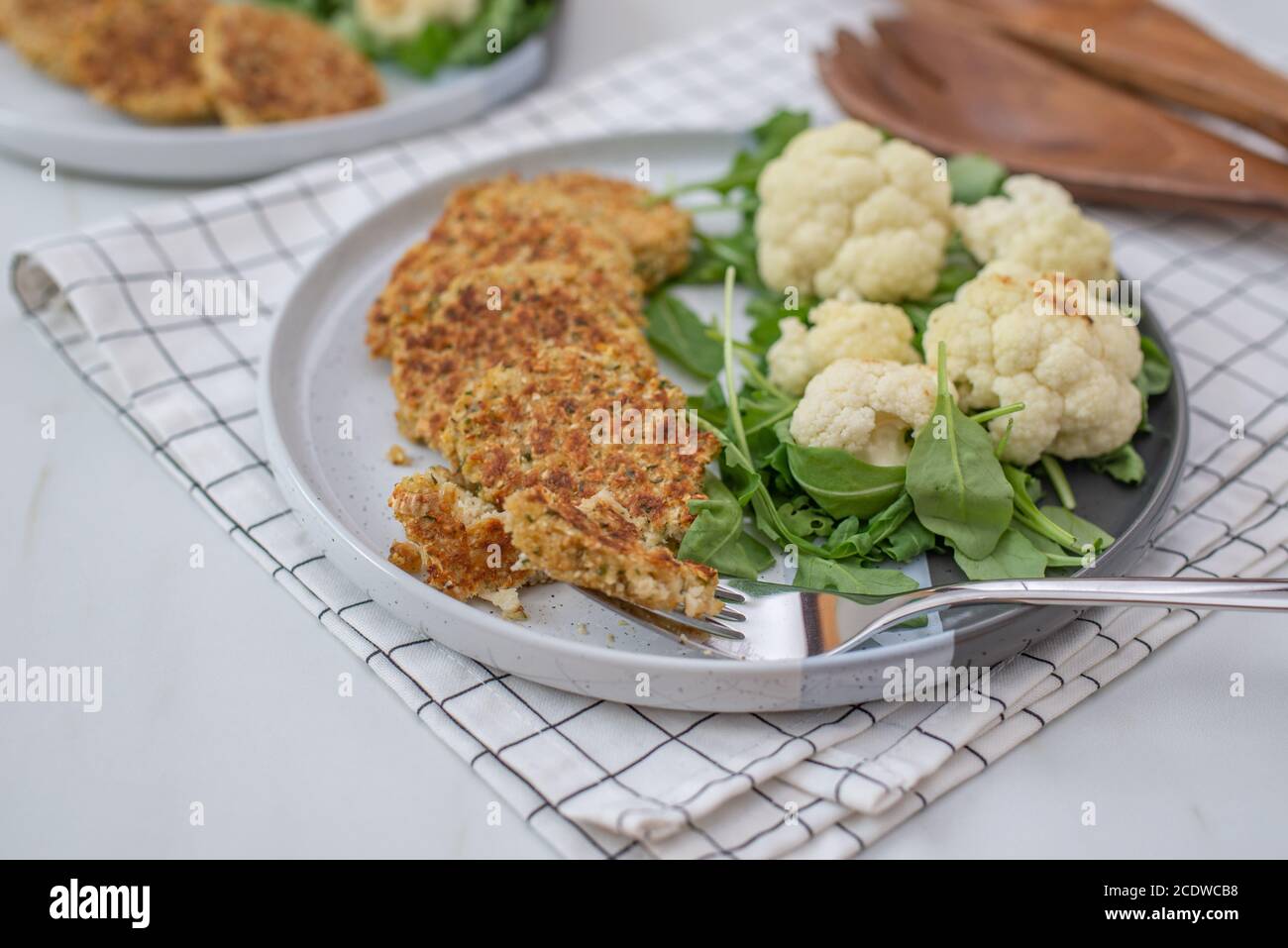 golden fried rosti pile from cauliflower and parmesan cheese Stock ...