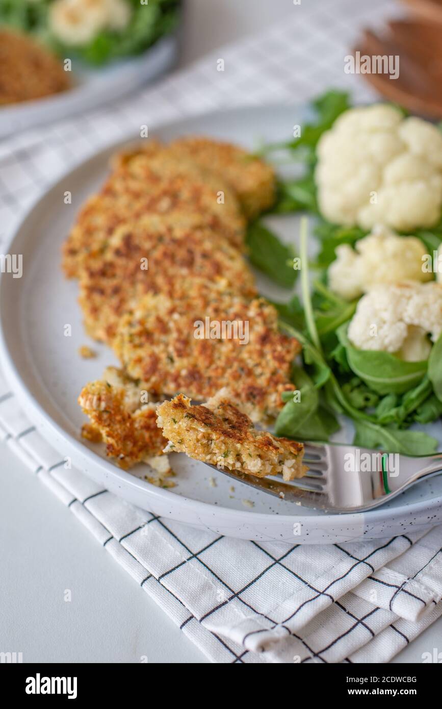 golden fried rosti pile from cauliflower and parmesan cheese Stock ...