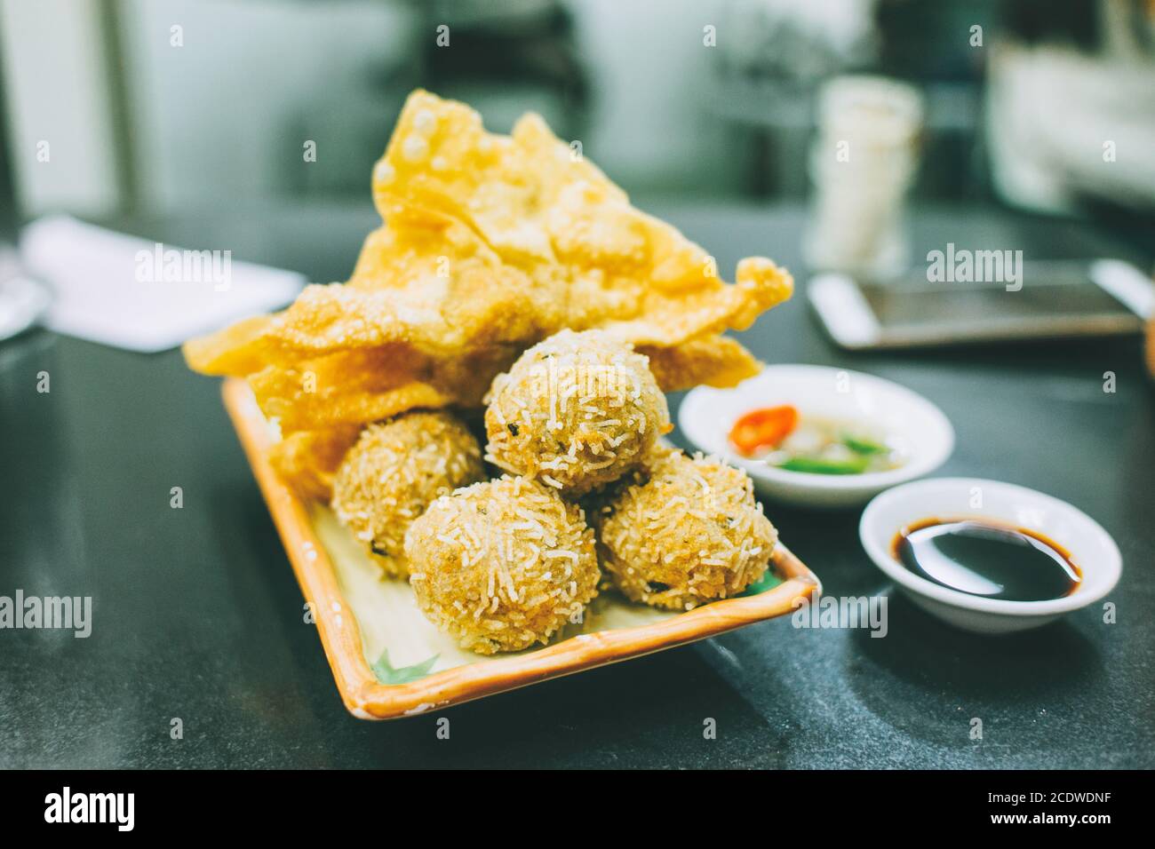 fried wanton and fish ball snack Stock Photo - Alamy