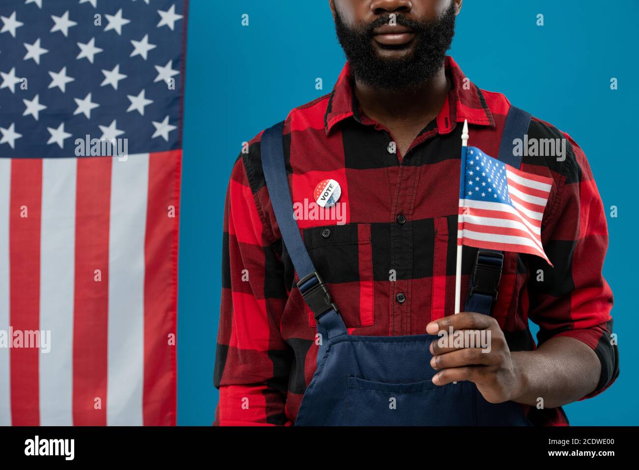 Person holding american flag hi-res stock photography and images - Alamy