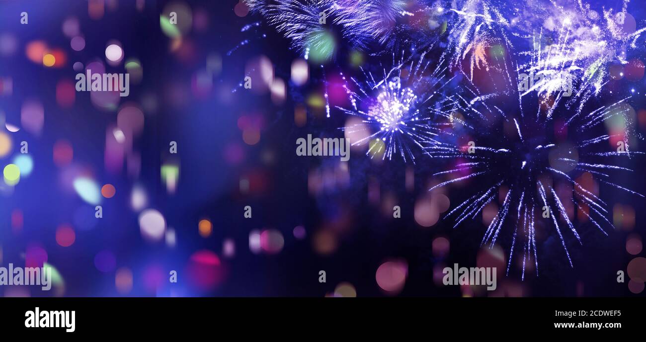 stars and lights pattern of bright sparkling colorful fireworks with ...
