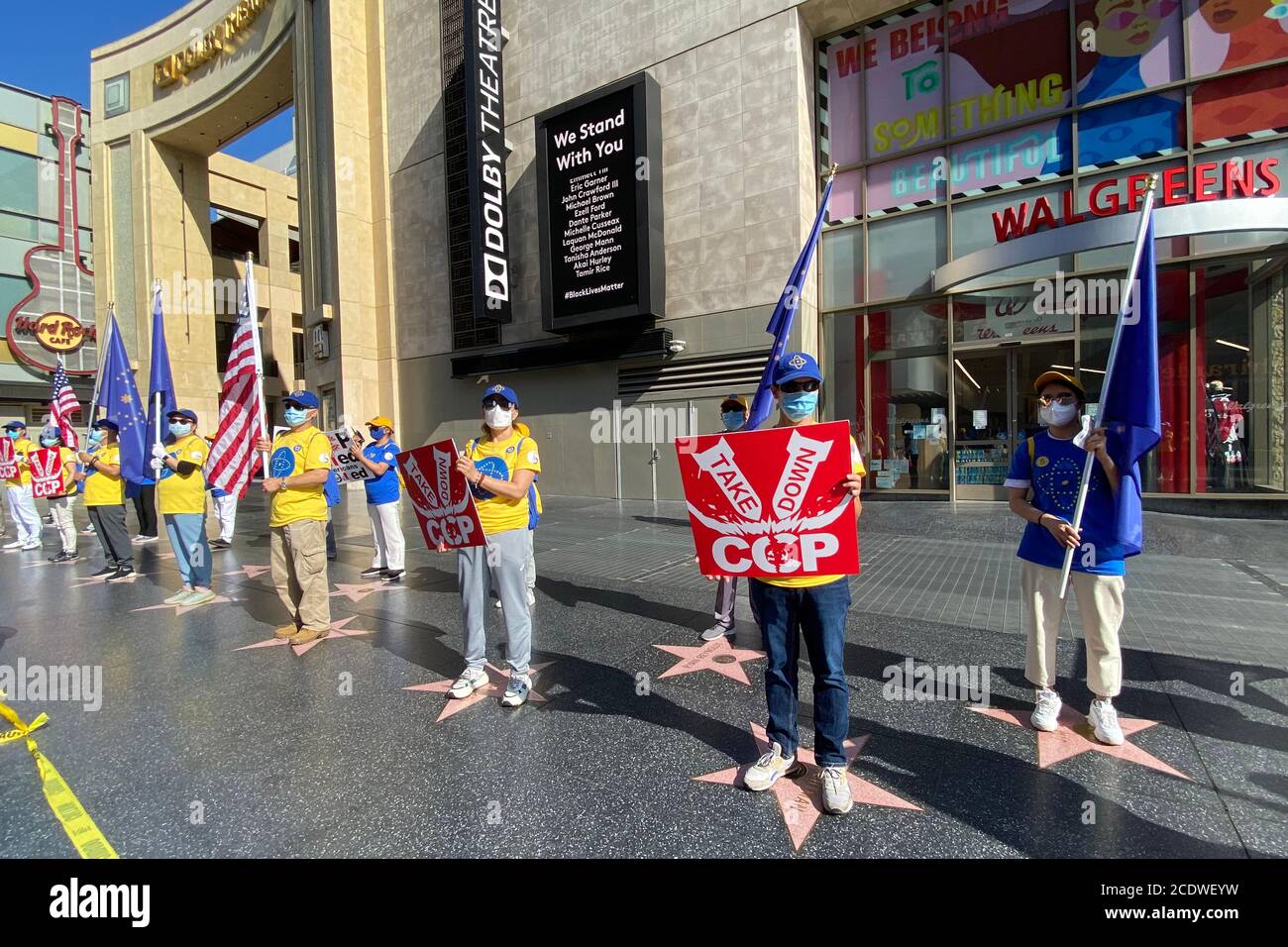 Hollywood, California. 29th Aug, 2020. Demonstrators hold flags during ...