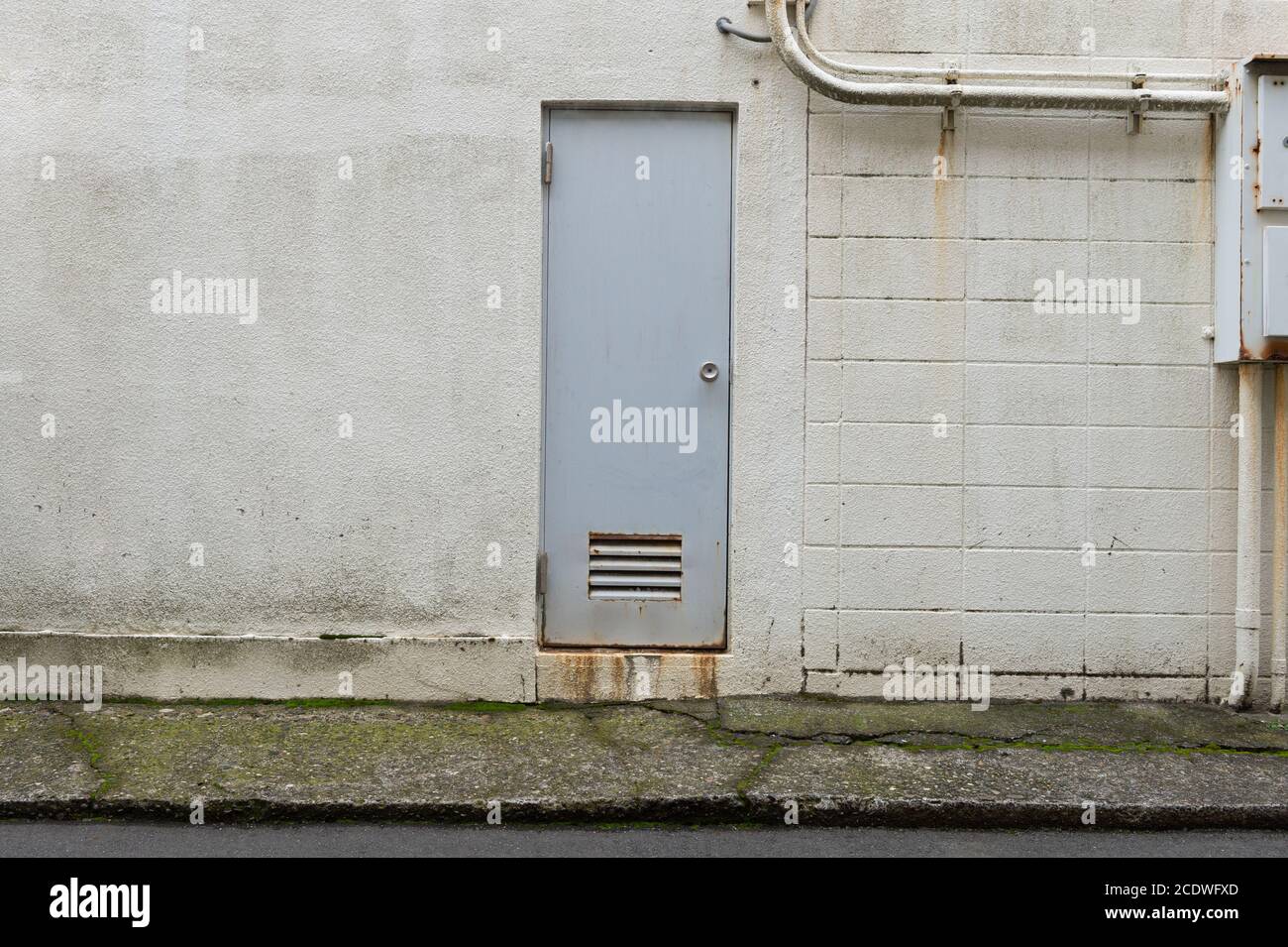 sidewalk by street wall & door Stock Photo - Alamy