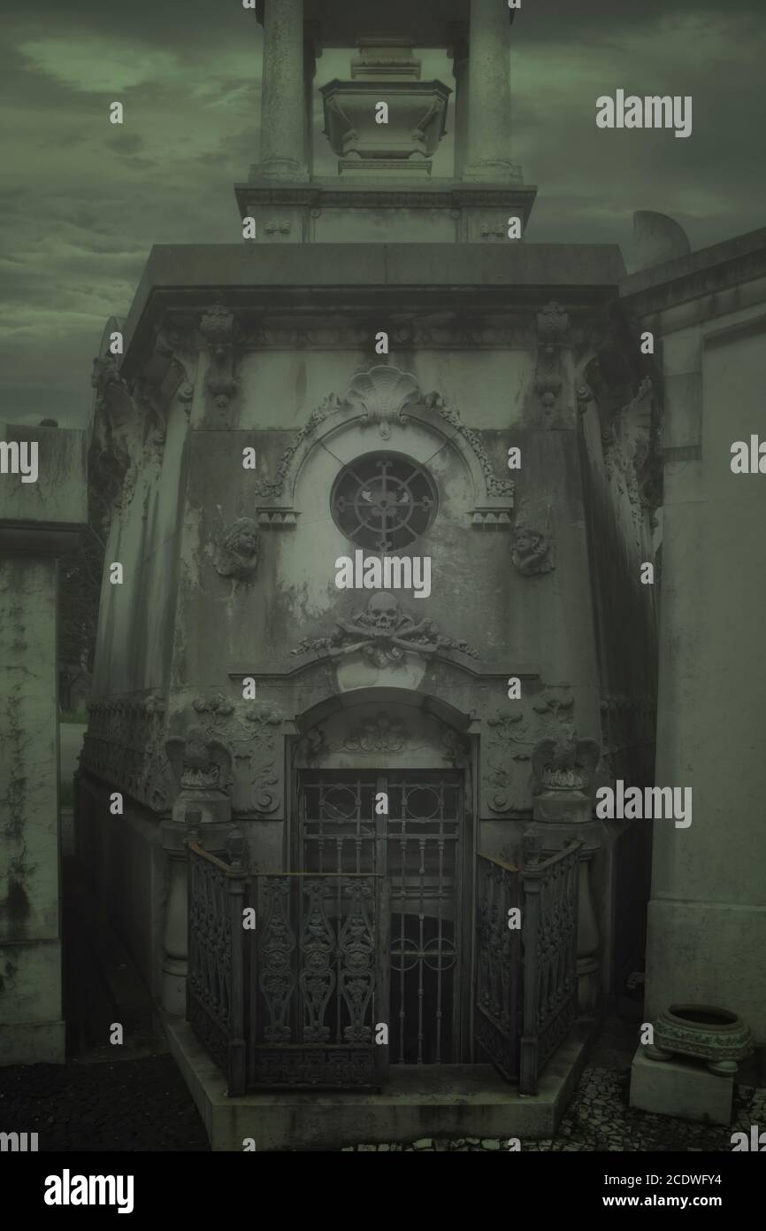 Mysterious and creepy old cemetery tomb Stock Photo - Alamy
