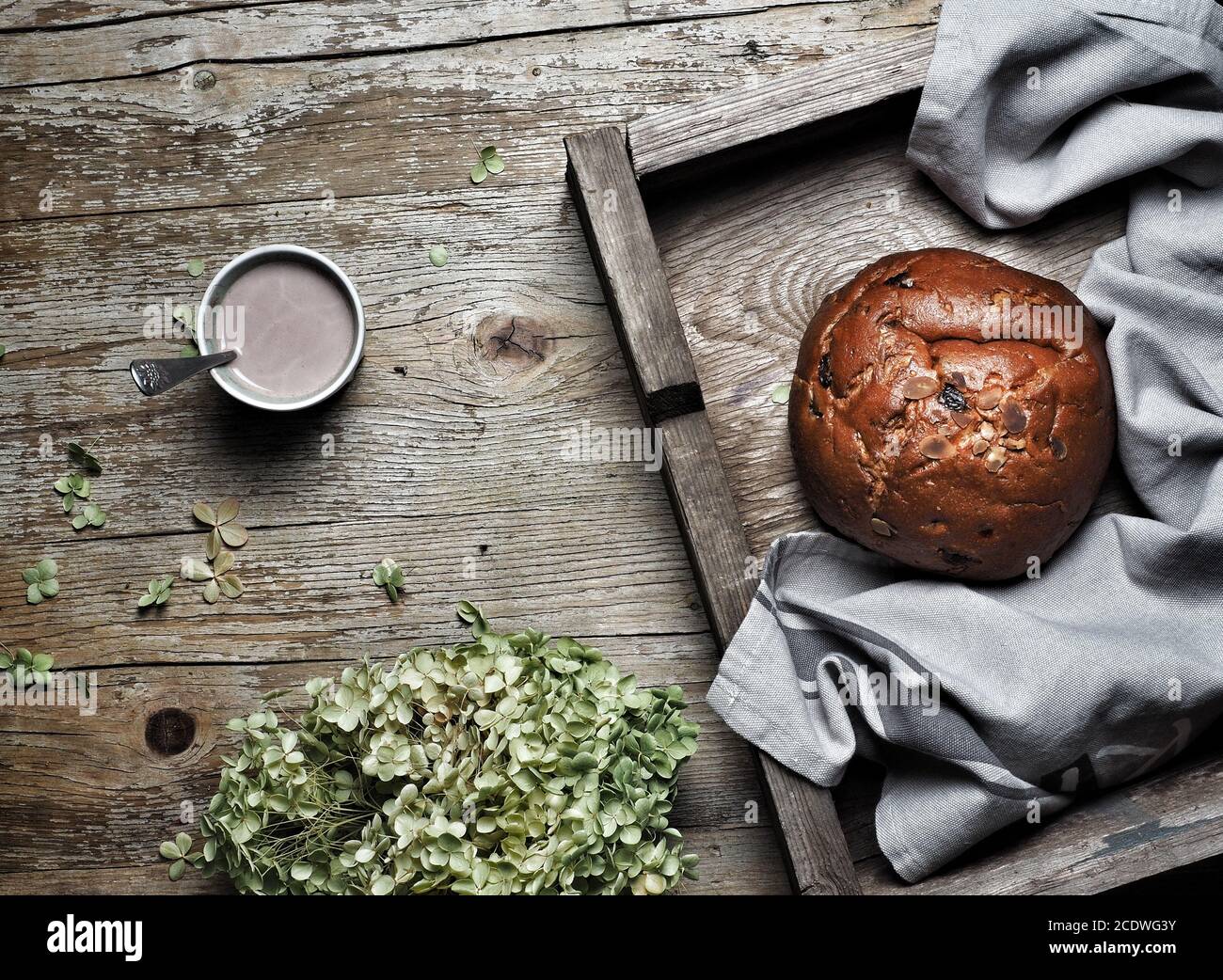 Sweet bread, typical Slovak cake. A cup of cocoa milk, white decorative ...