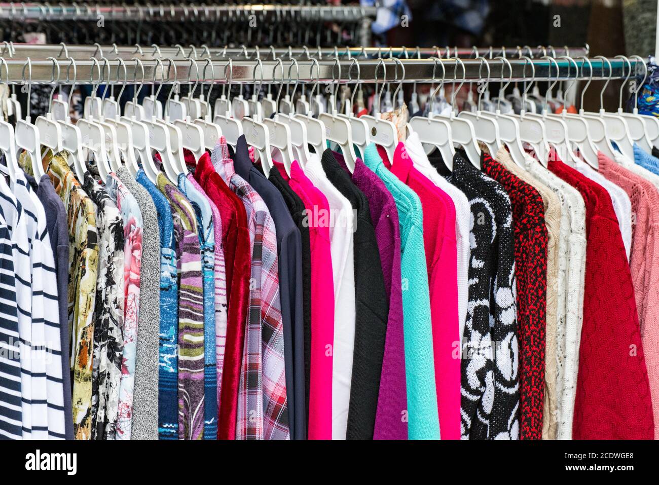 Clothes on a hanger Stock Photo - Alamy