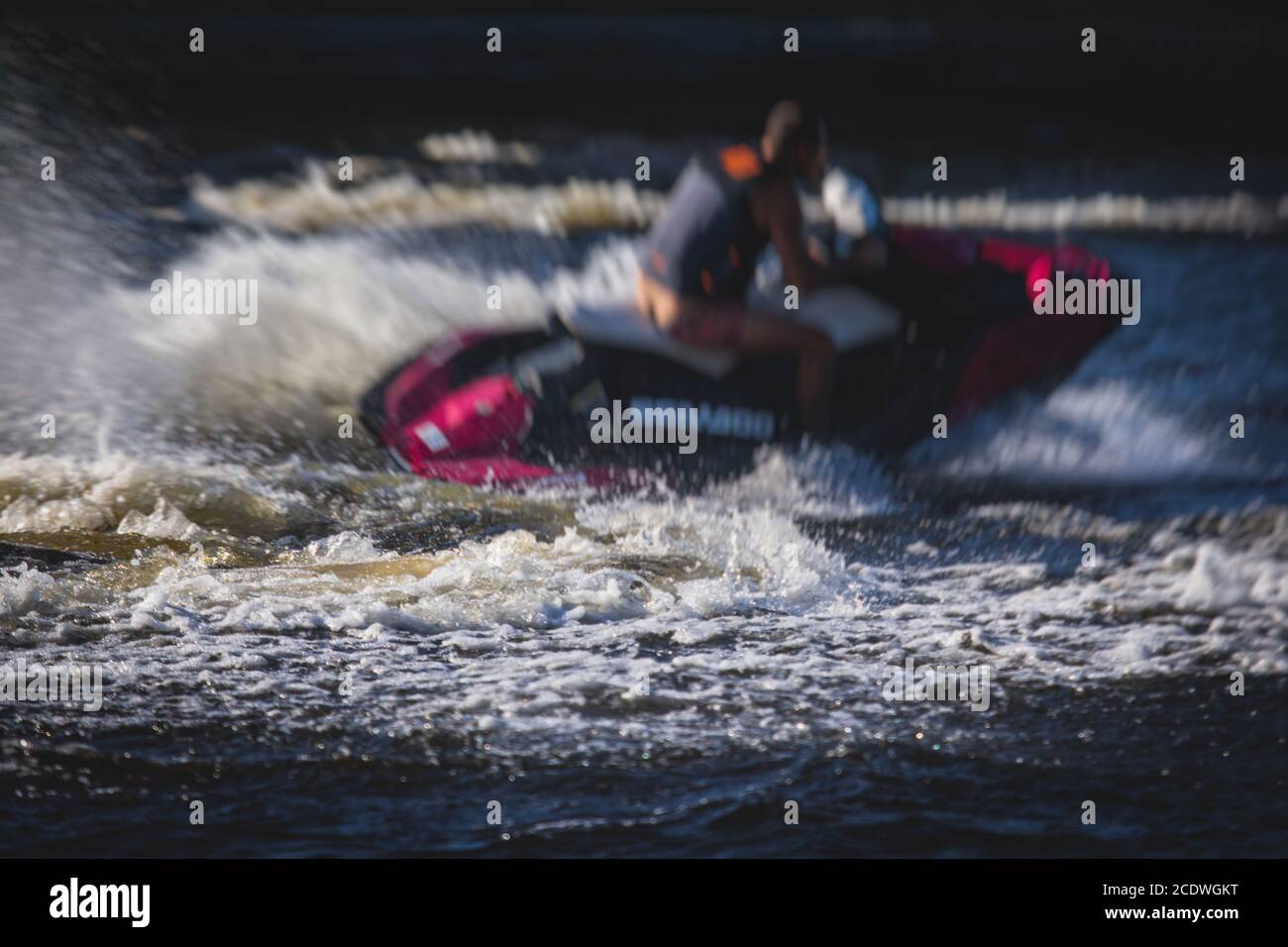 View of jet ski in motion, group of jet skiers with a big water splash ...