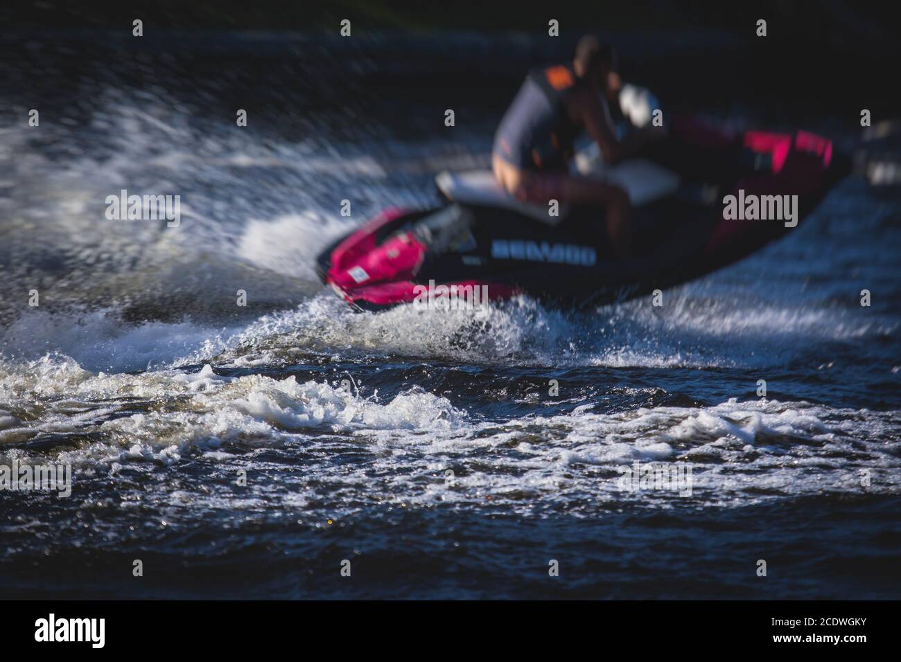 View of jet ski in motion, group of jet skiers with a big water splash ...