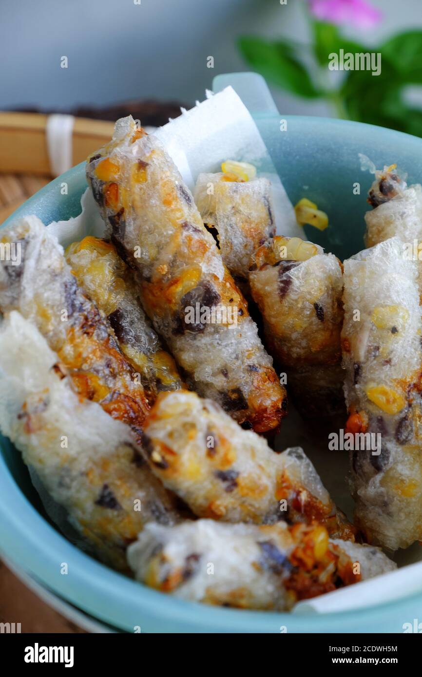 Close up deep fried corn spring rolls, delicious vegan dish from corn ...