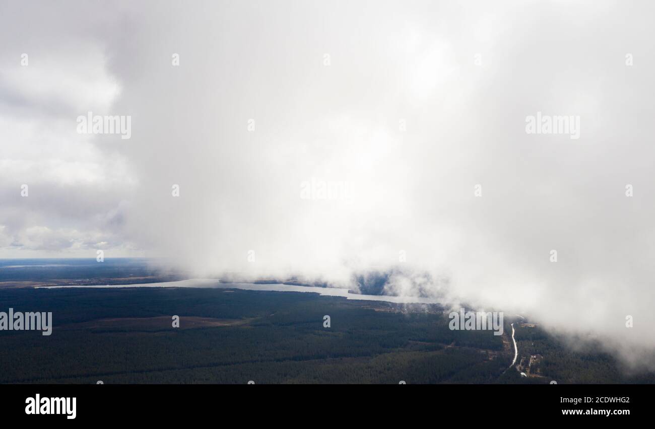 Aerial image of dark storm clouds over the land. Aerial panorama of ...