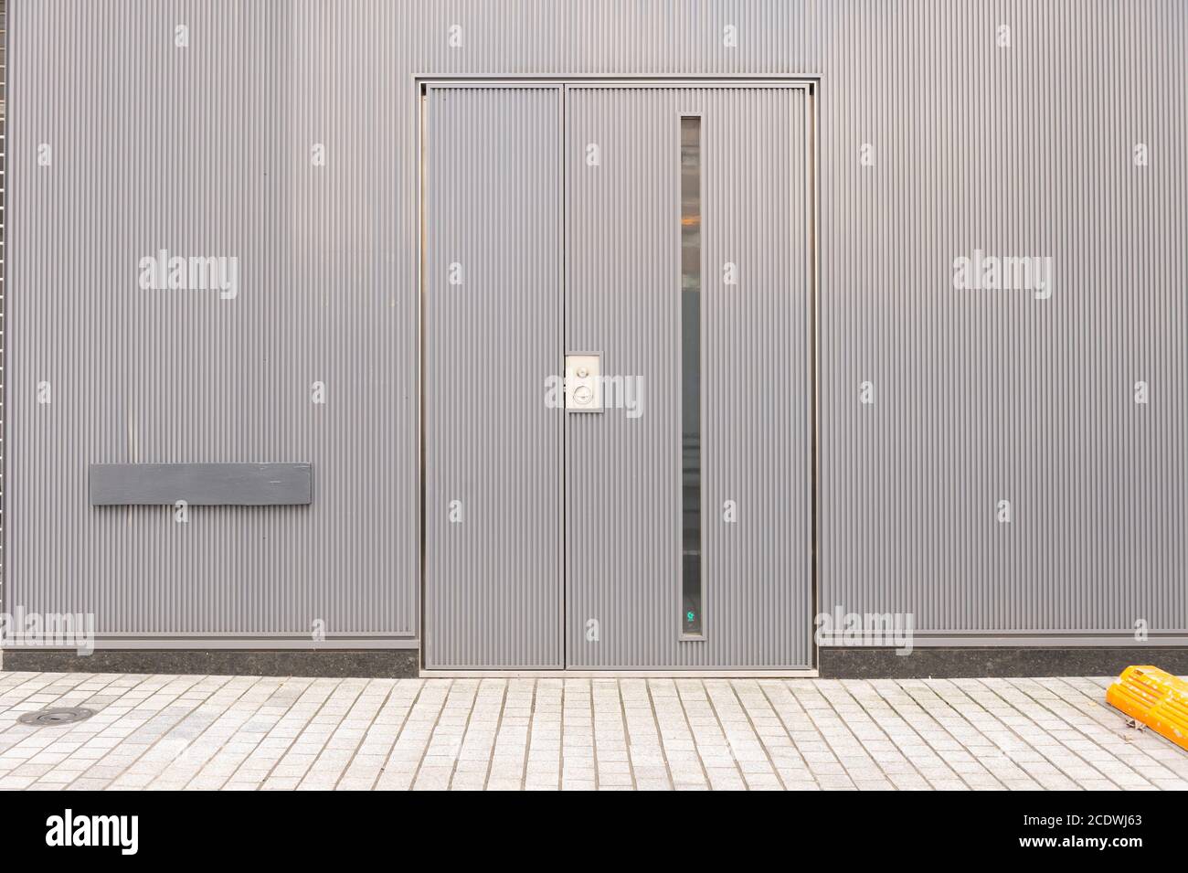 sidewalk by street wall & door Stock Photo - Alamy