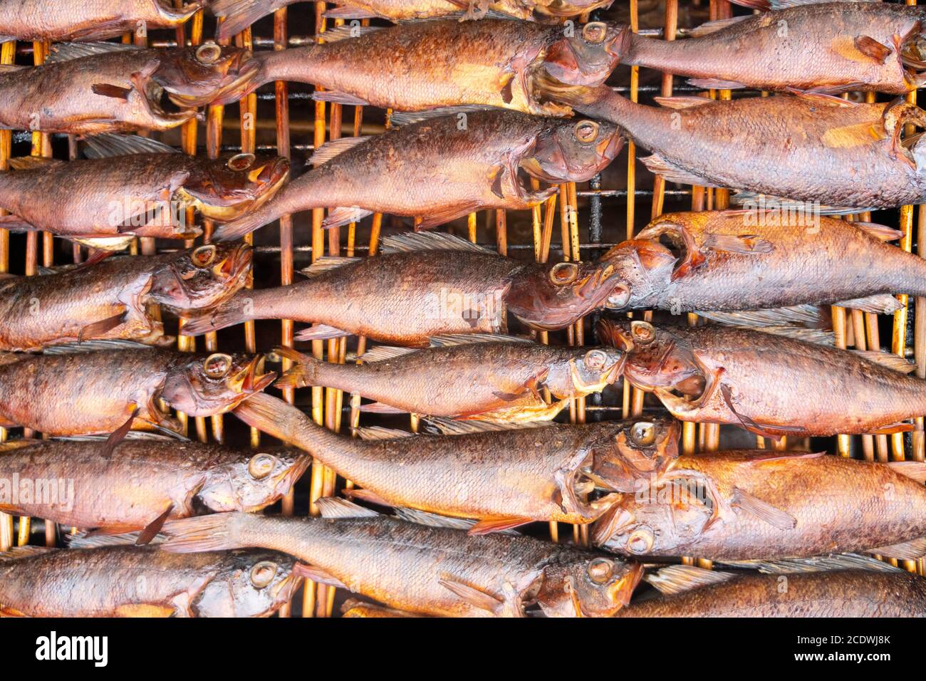 Smoked fish. Smoke. Hot Smoked fish meat. Smoked fish. Perch. Smoked ...