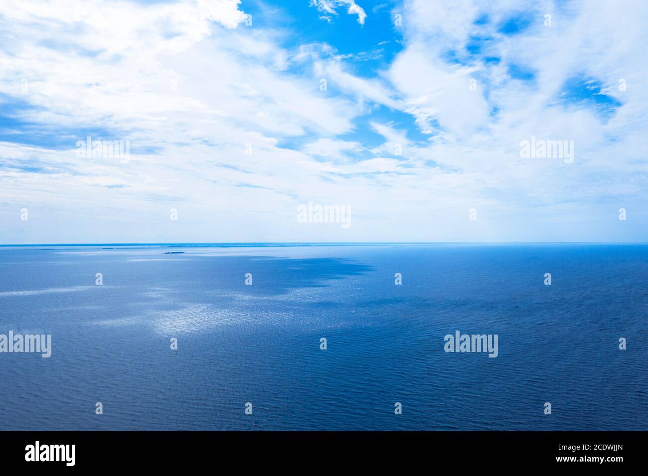 Aerial view of a blue sea water background. Drone view. Waves water ...
