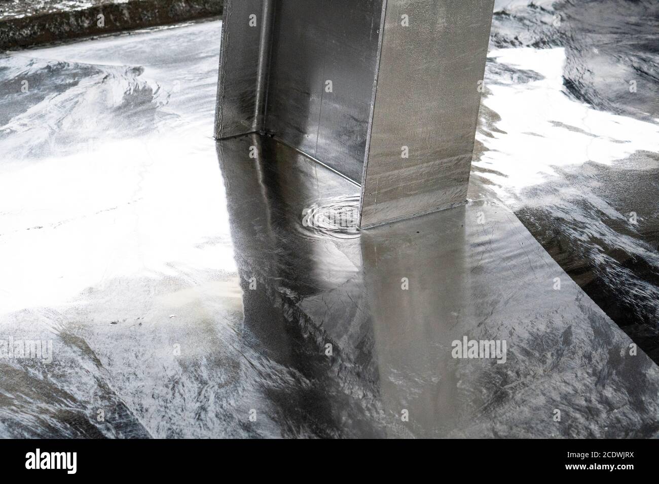 Galvanized parts. Galvanized industrial parts on a construction site ...