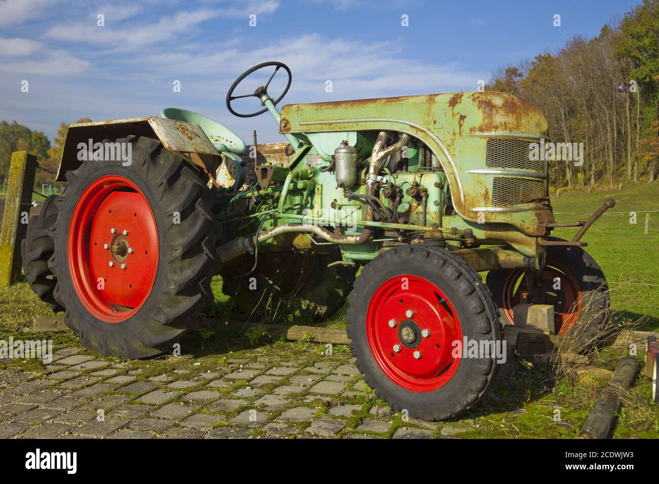 Old discarded tractor Stock Photo - Alamy