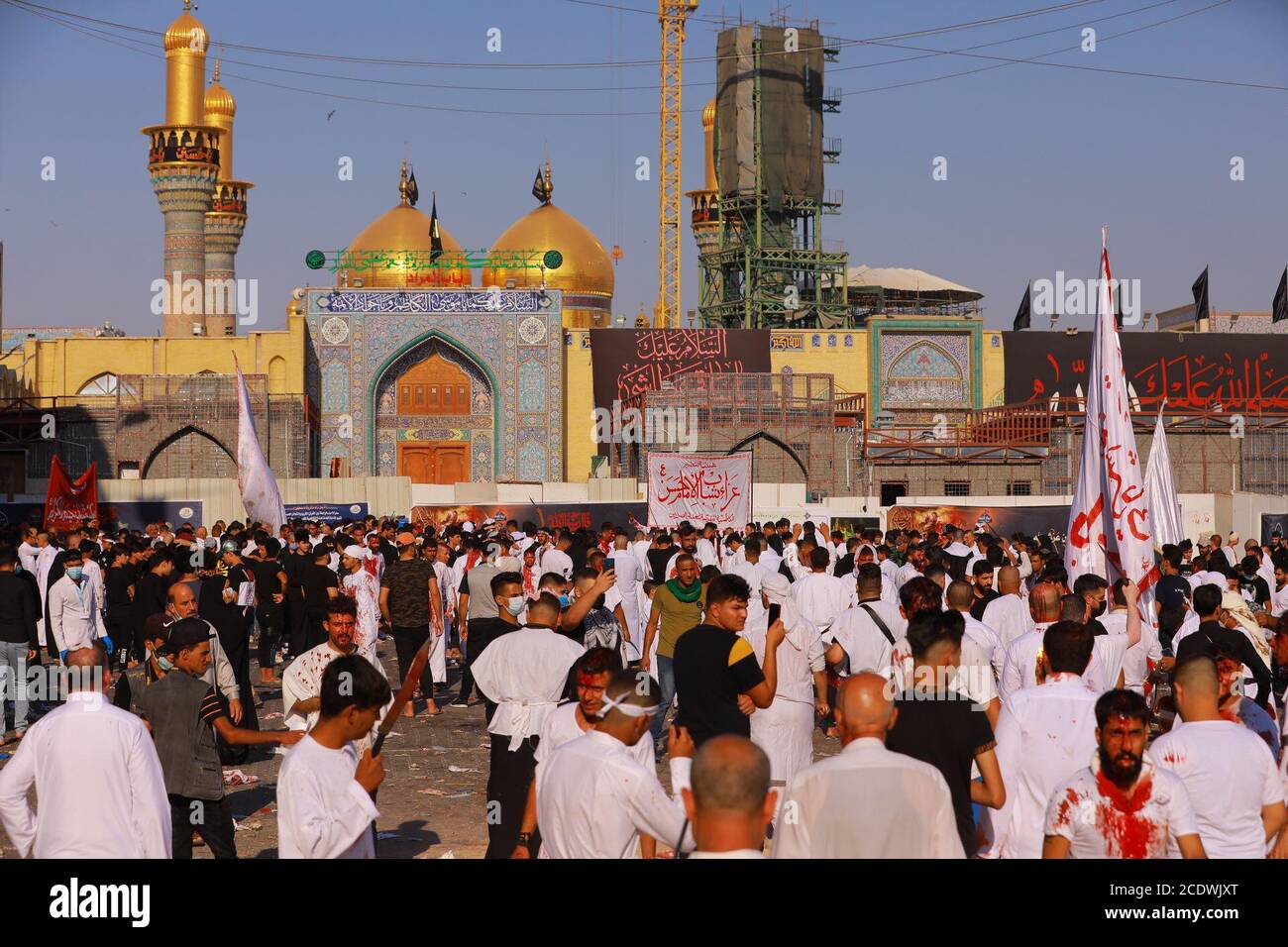 Baghdad, Iraq. 30th Aug, 2020. Shiite Muslims men hit their head with ...