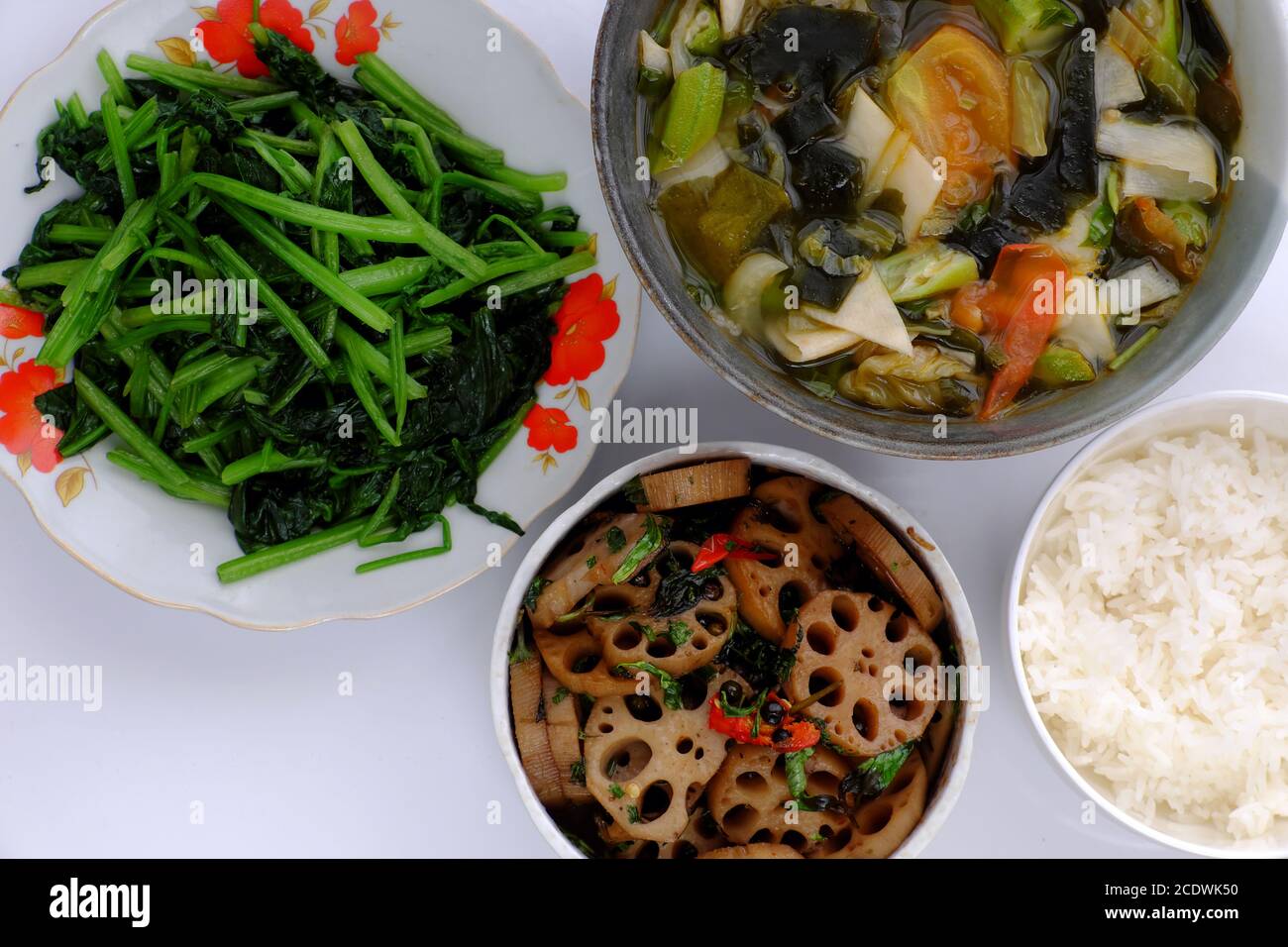 vegan daily meal, lotus root sliced cook with sauce, vegetables soup ...
