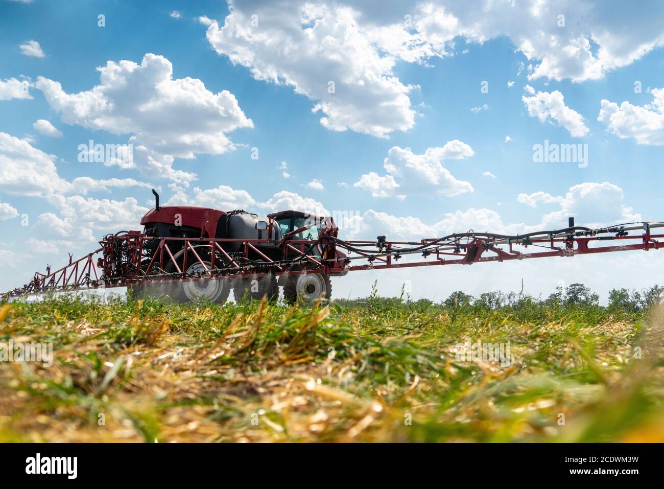 Machine for spraying pesticides and herbicides on the field Stock Photo ...
