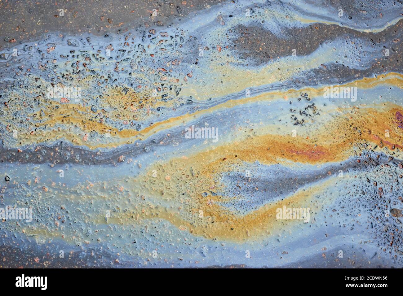Colorful oil slick on pavement hi-res stock photography and images - Alamy