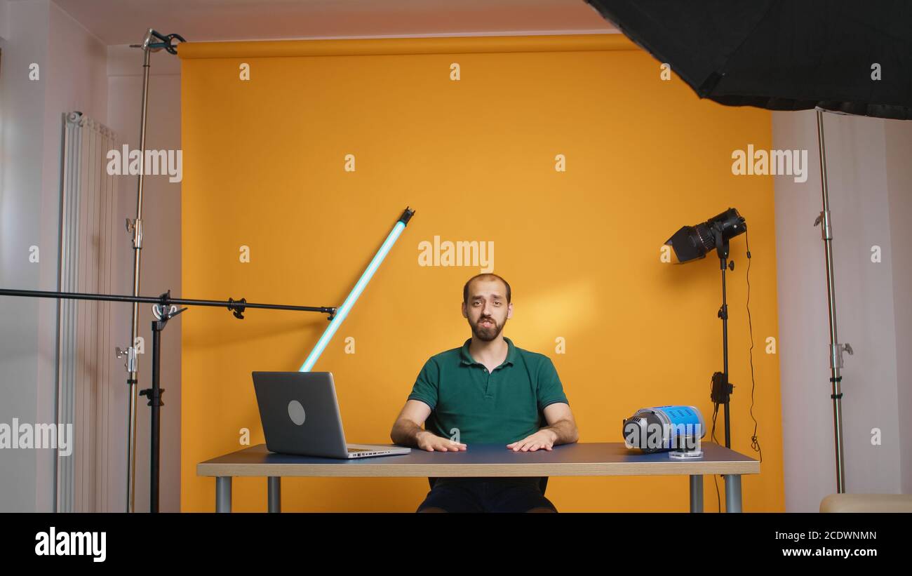 Happy famous content creator recording intro for his vlog and ...