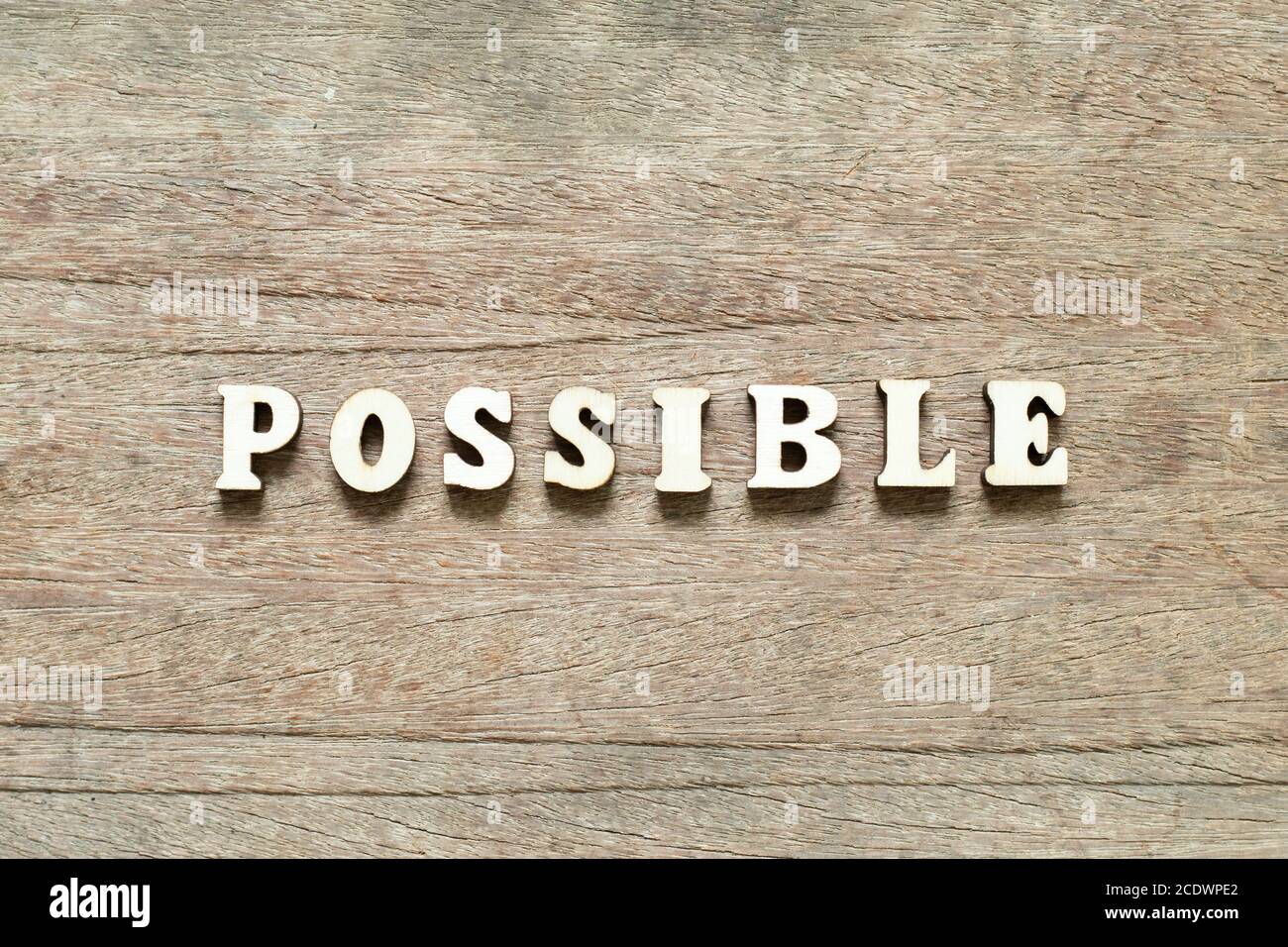 Alphabet letter block in word possible on wood background Stock Photo ...